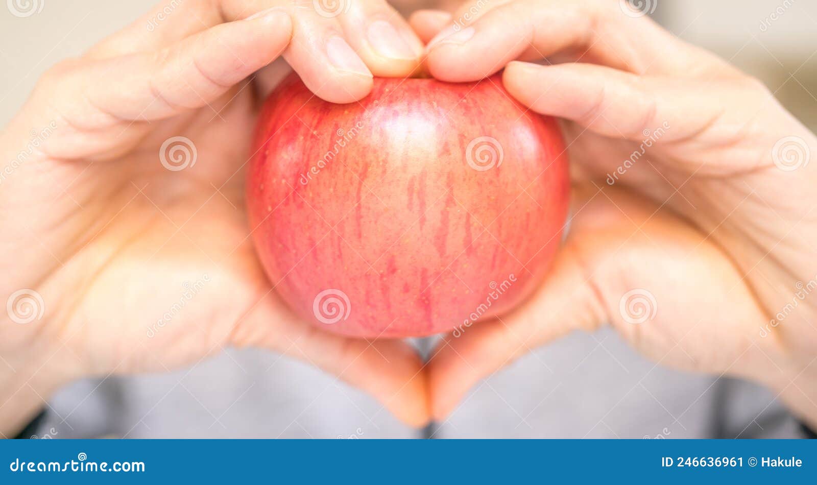 Two Hands Holding Red Apple, Giving You Stock Image - Image of style ...
