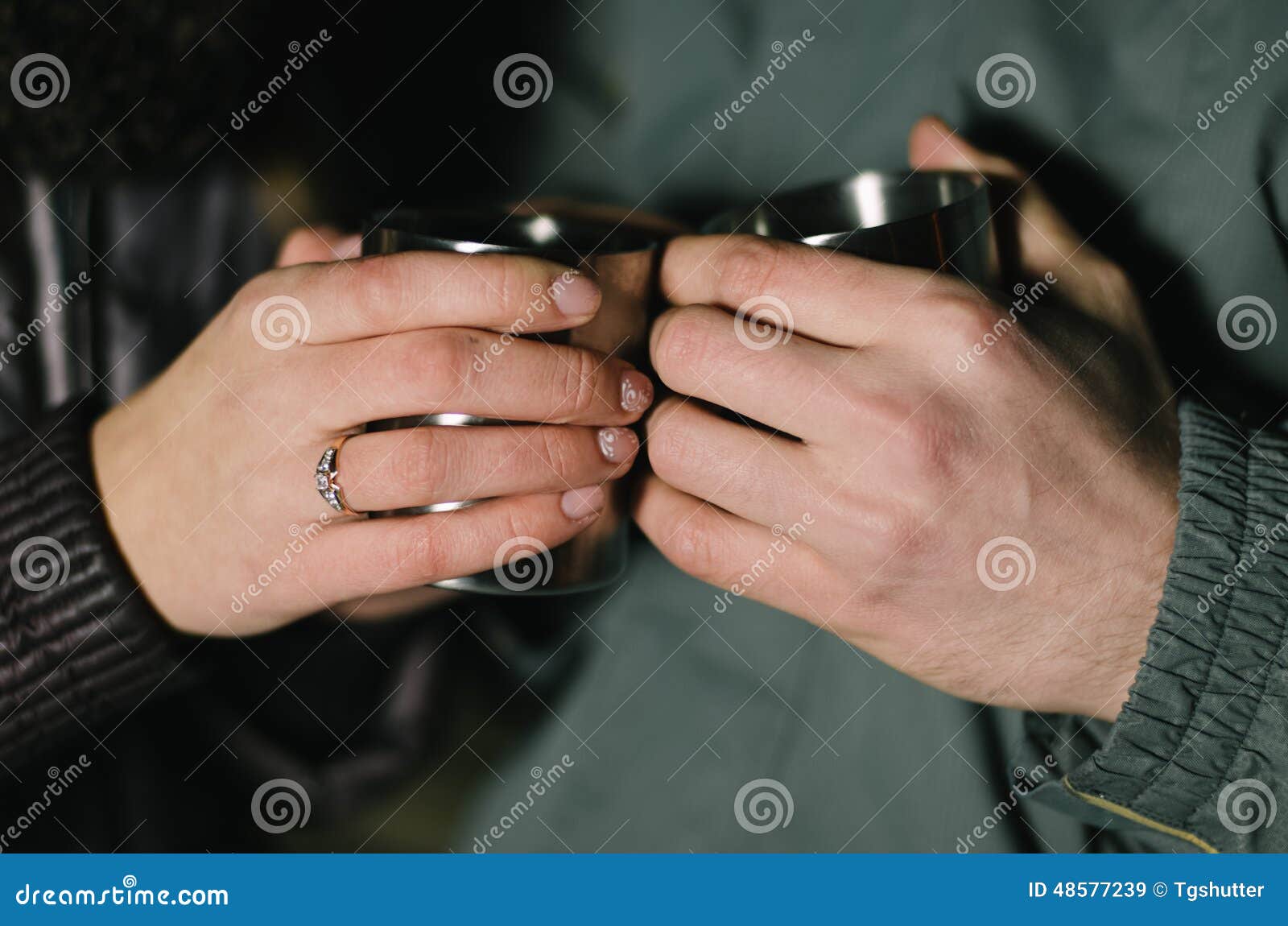 Two Hands are Holding Two Cups Stock Image - Image of pause, hand: 48577239