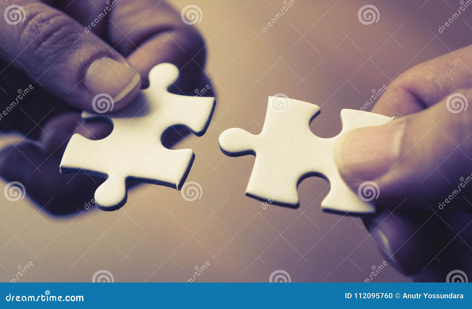 Two Hands Joining Together Two Jigsaw Stock Photo - Image of shape ...