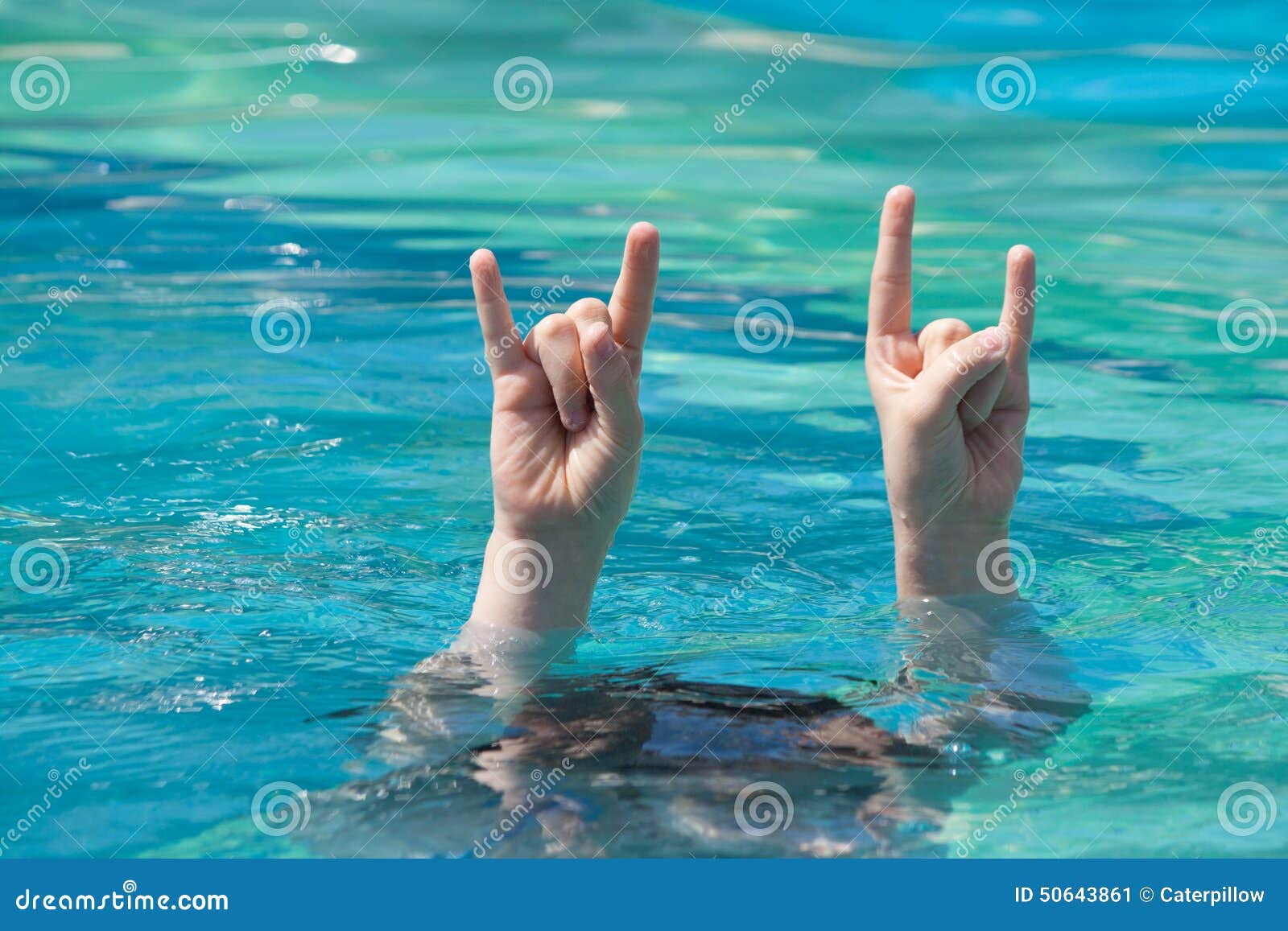 Two Hands Out of Water in Rock Gesture Stock Image - Image of rescue ...