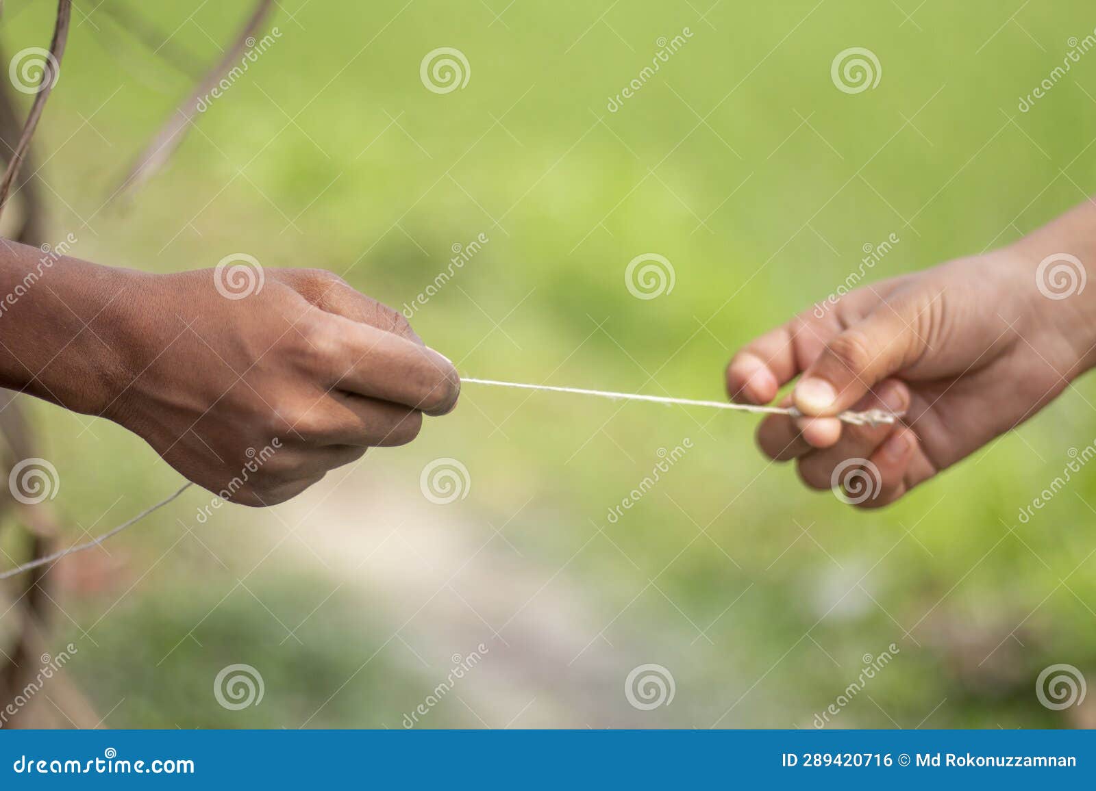 Two Hands are Pulling a Thread from Both Hands Stock Photo - Image of ...