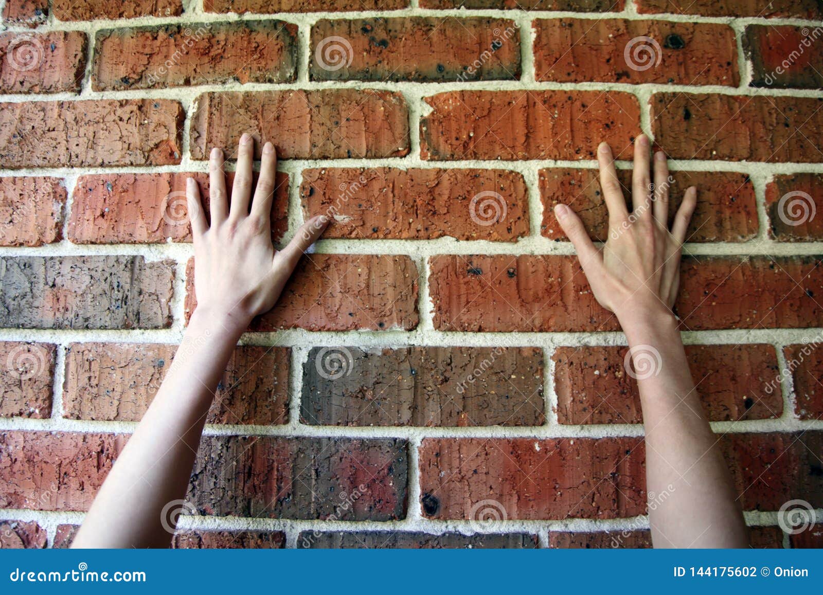 Hands Pushing A Wall