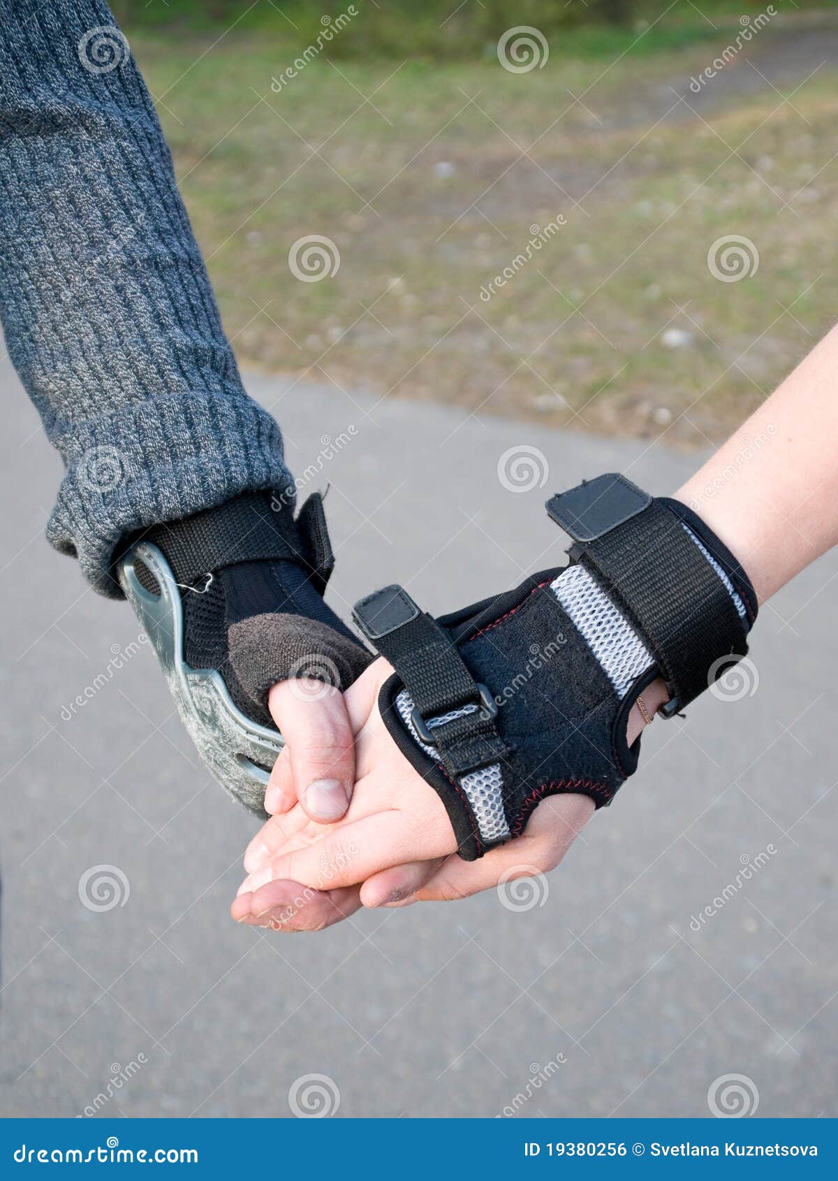 Two Hands in Roller Protection Stock Photo - Image of skating, girls ...