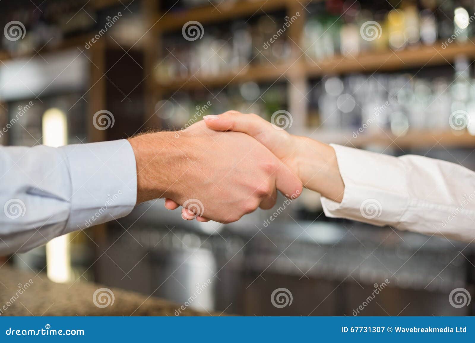 Two hands shaking stock image. Image of hands, closeup - 67731307