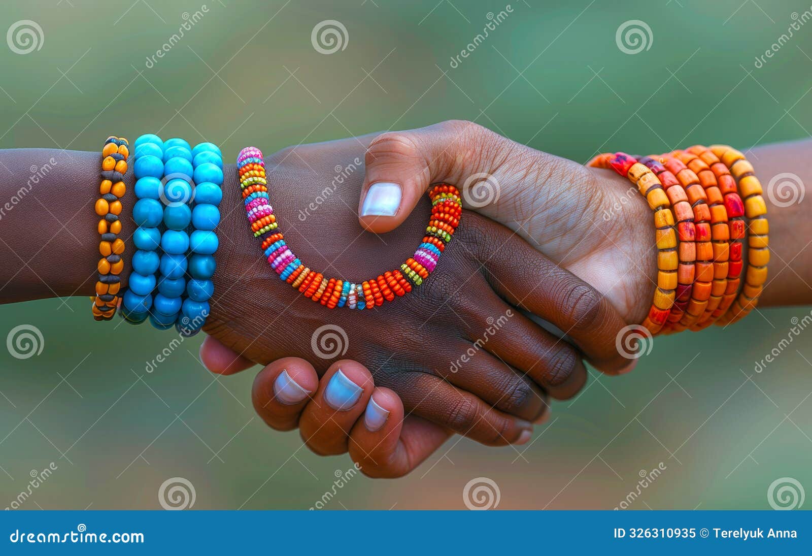 Two Hands Shaking Hands with Bracelets on Wrists. Concept of Unity and ...