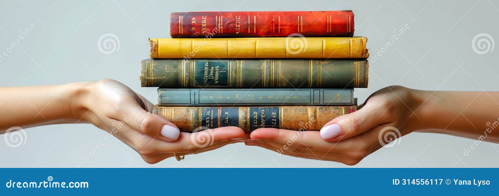Two Hands Supporting a Stack of Antique Books. Old Books in Hand Stock ...