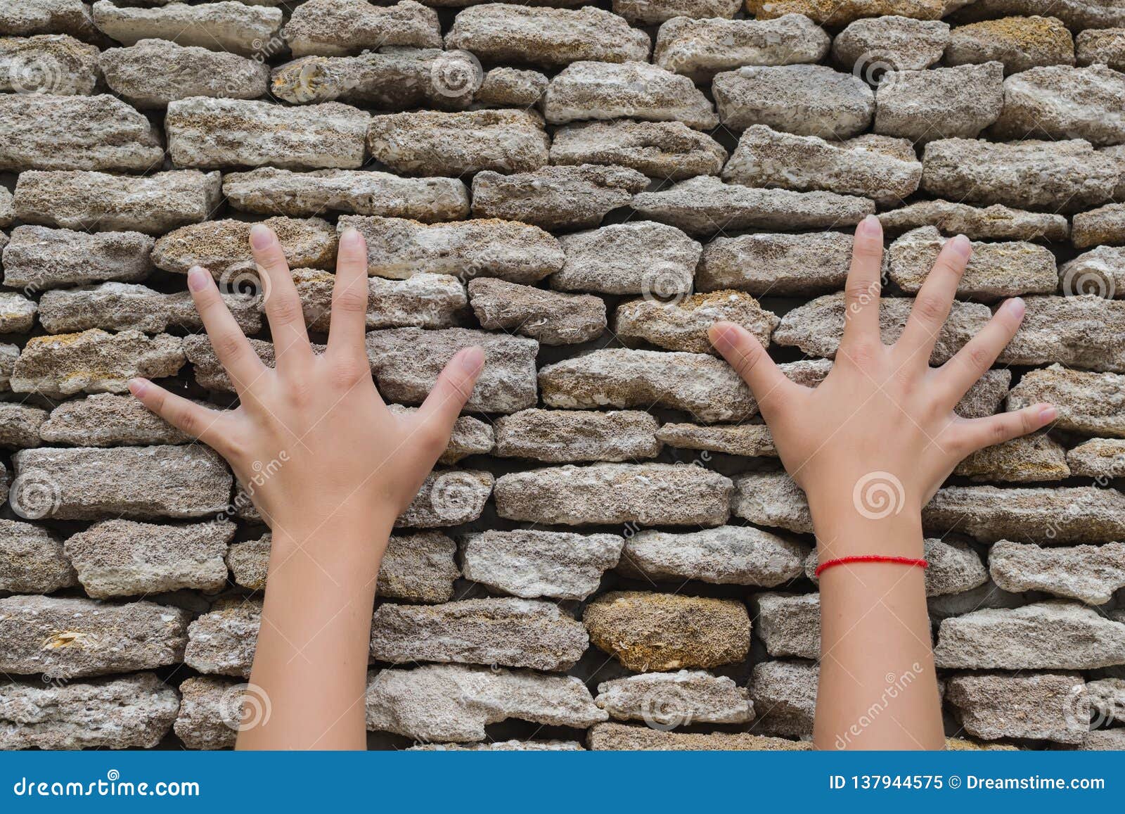 Two Hands Touched a Stone Wall Stock Image - Image of impassable, stone ...