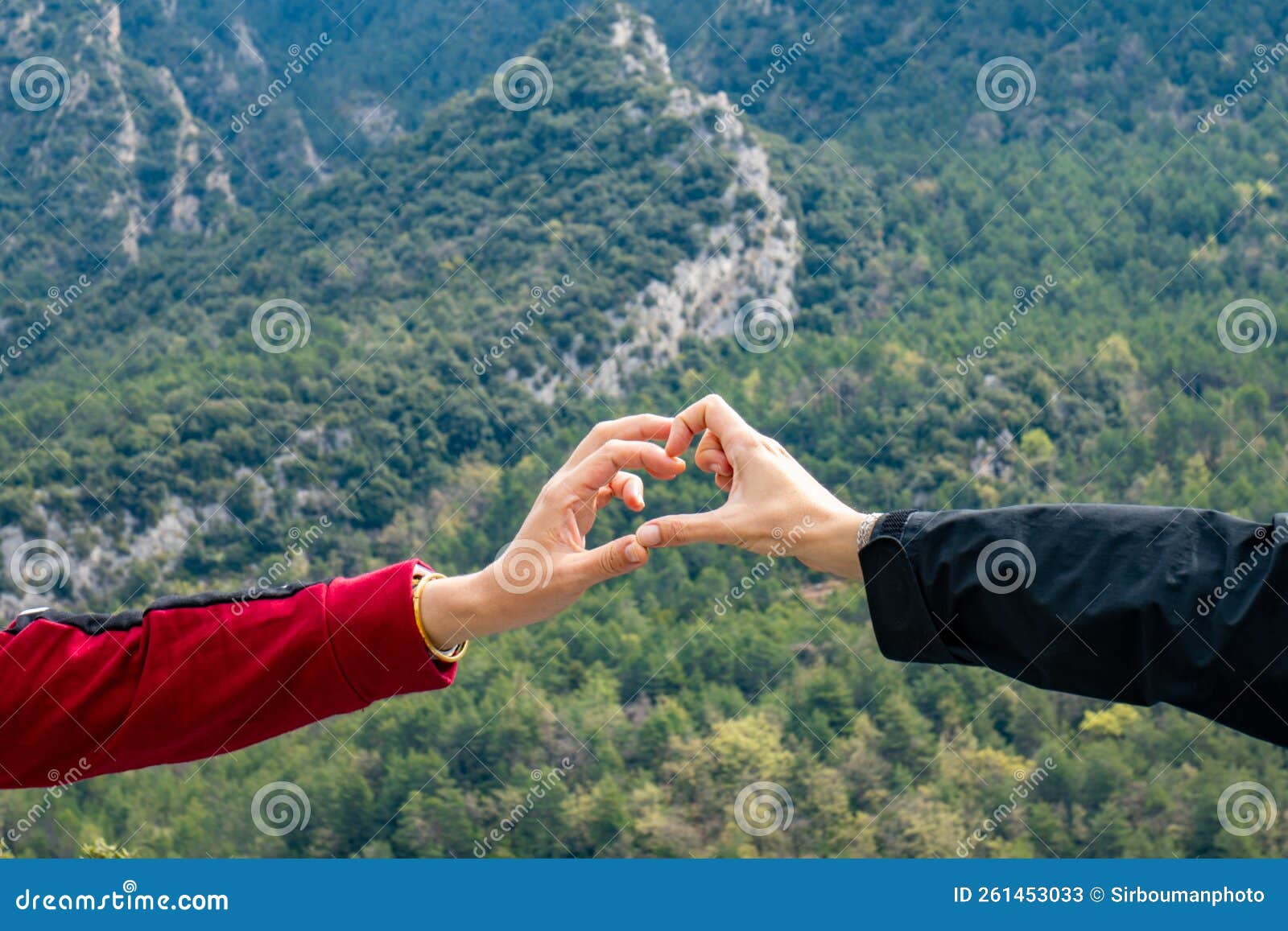 Two Hands Touching Each Other Making the Shape of the Heart with a ...