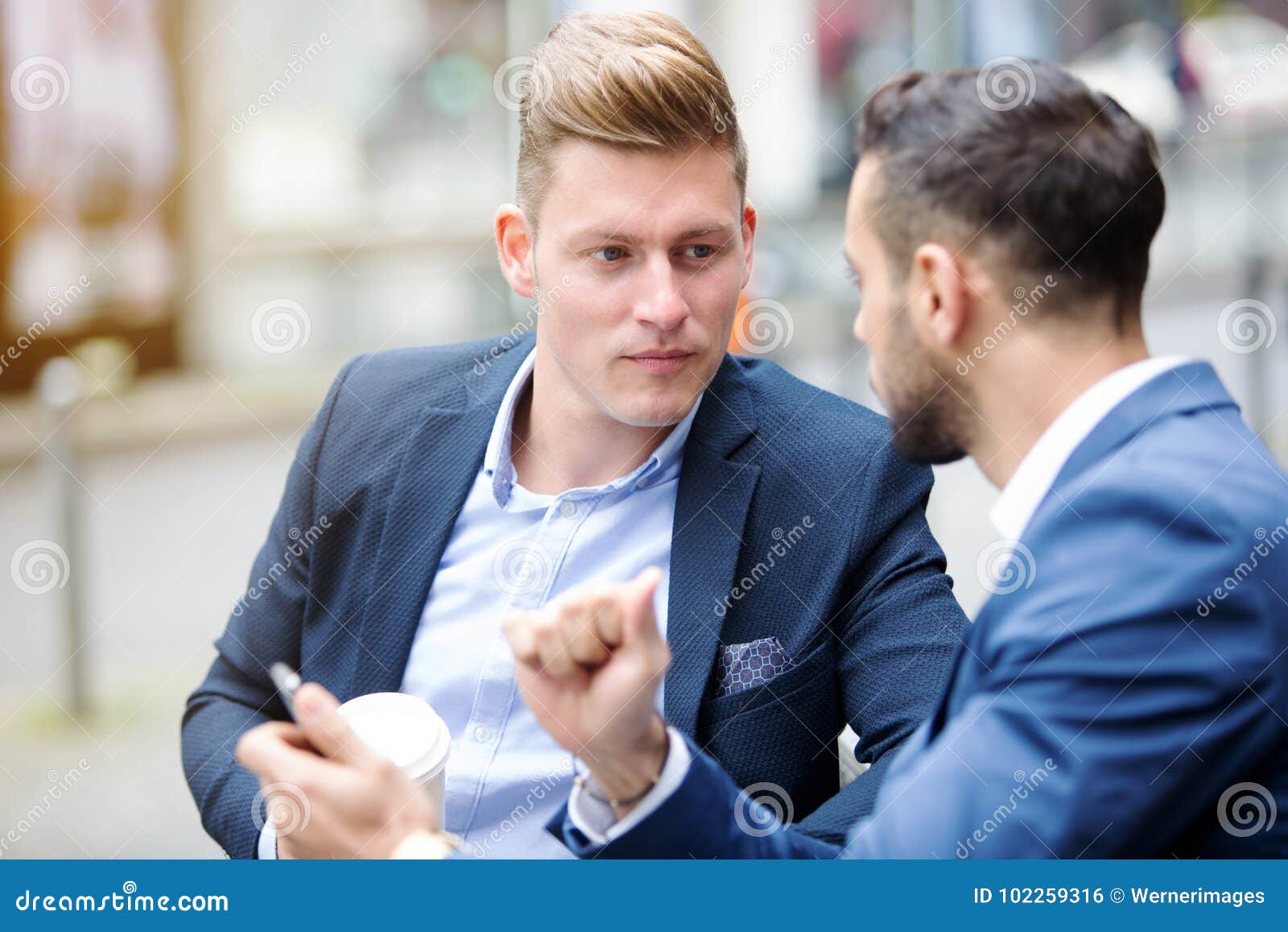 Two Businessmen Talking Outside in the Street Stock Photo - Image of ...