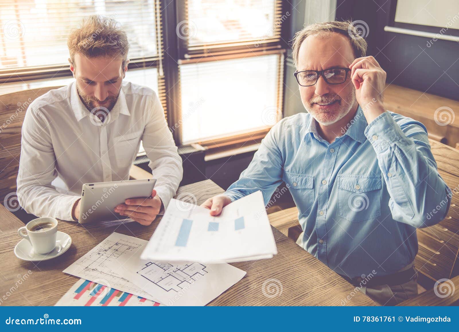 Two Handsome Businessmen Working Stock Image - Image of mature ...