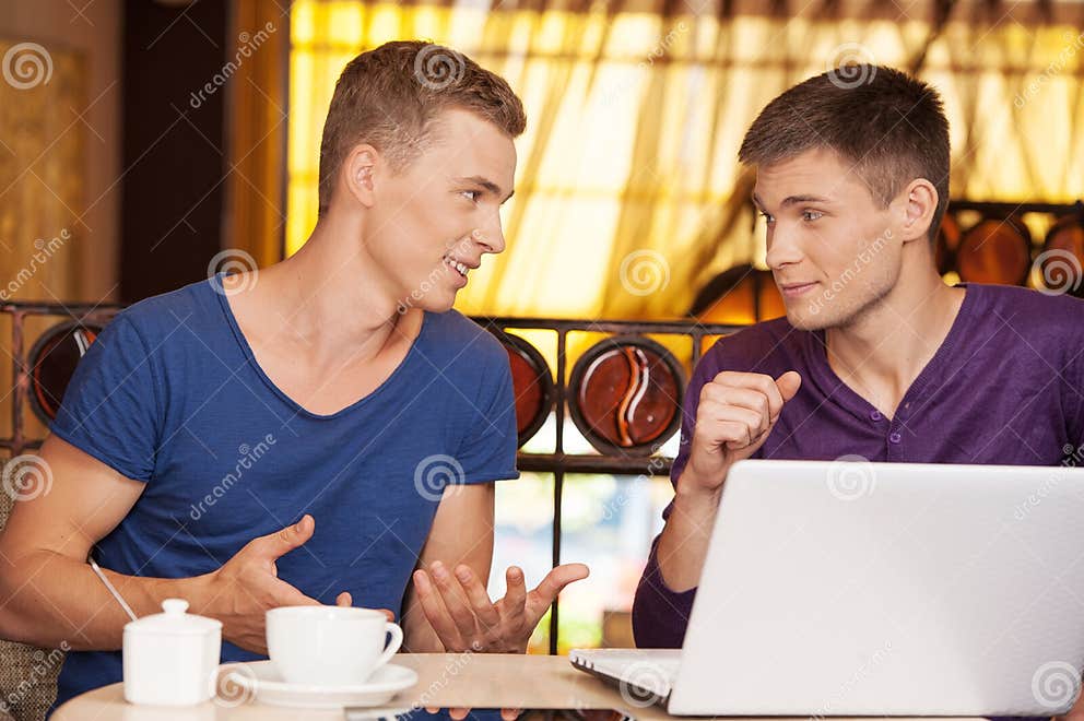 Two Handsome Men Talking at Lunch. Stock Image - Image of arguing ...