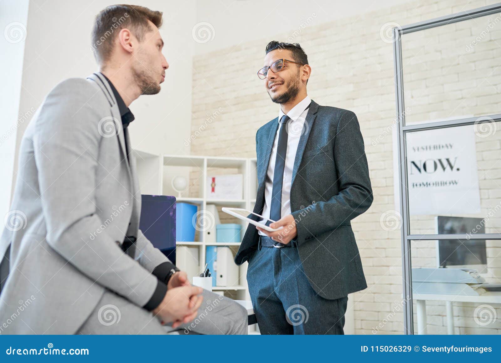 Chatting Animatedly with Colleague Stock Image - Image of talking ...