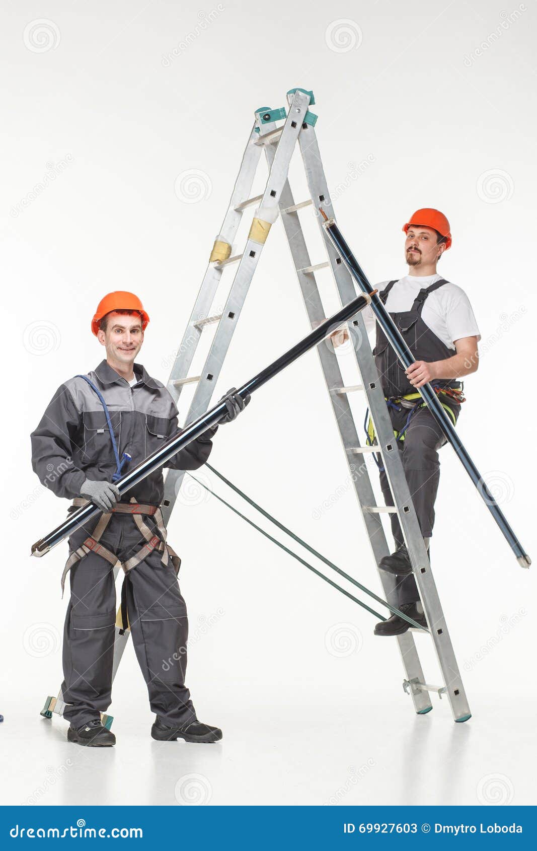 Two handymen at work stair stock image. Image of protective - 69927603