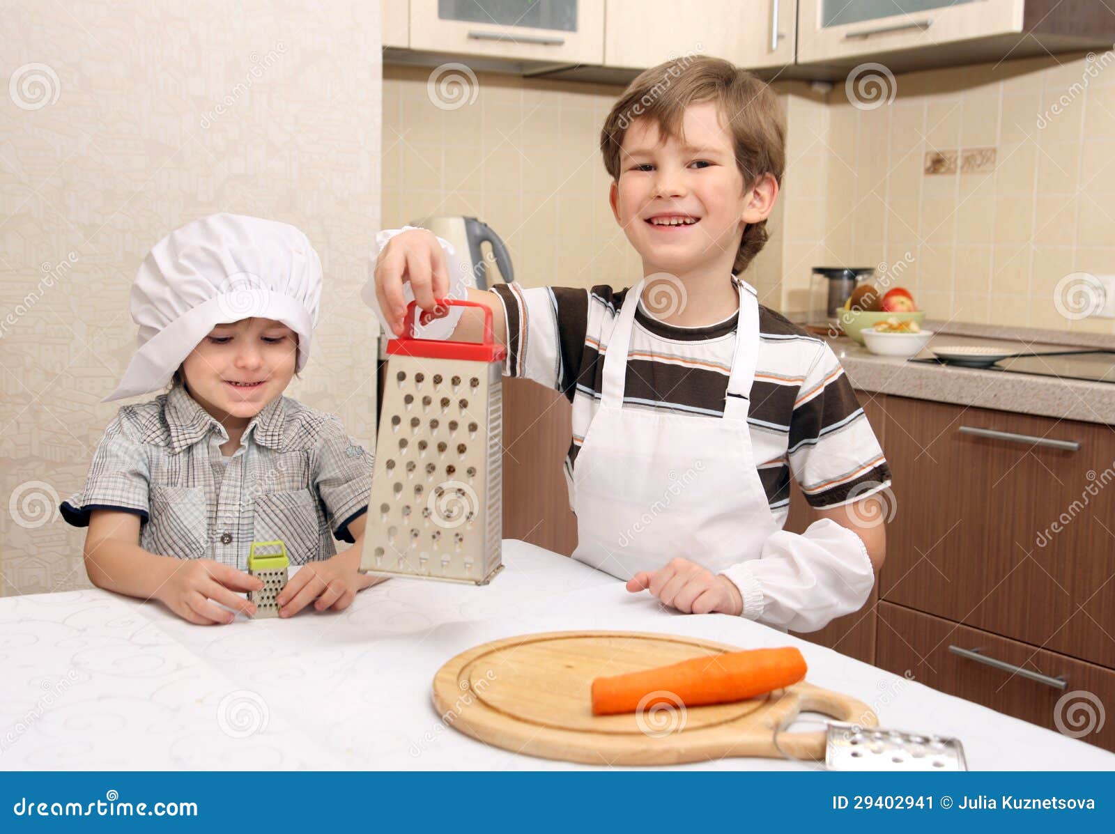 Two happy boys in kitchen stock image. Image of brothers - 29402941