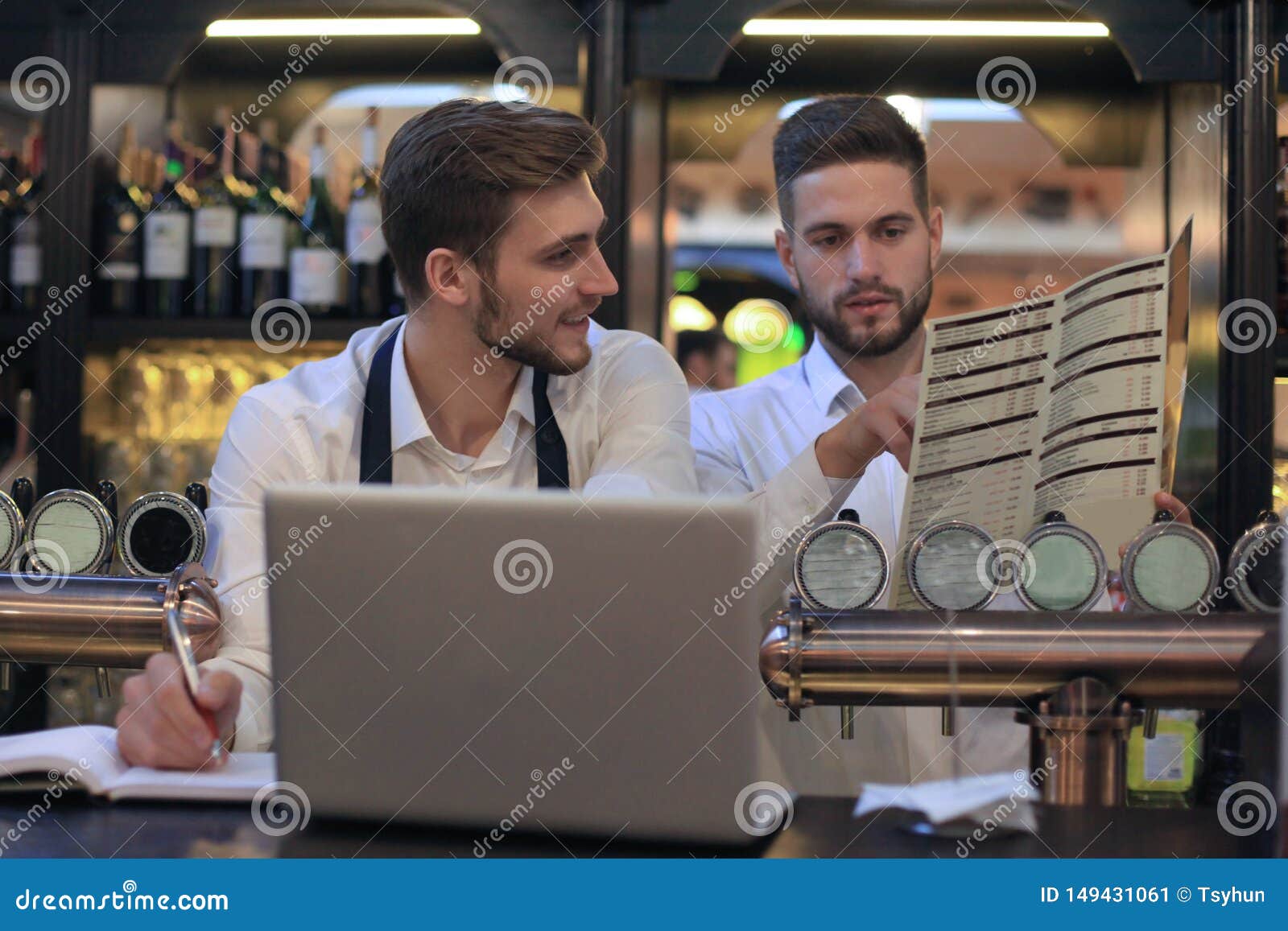 Two Happy Cafe Managers Working on Laptop Stock Image - Image of ...