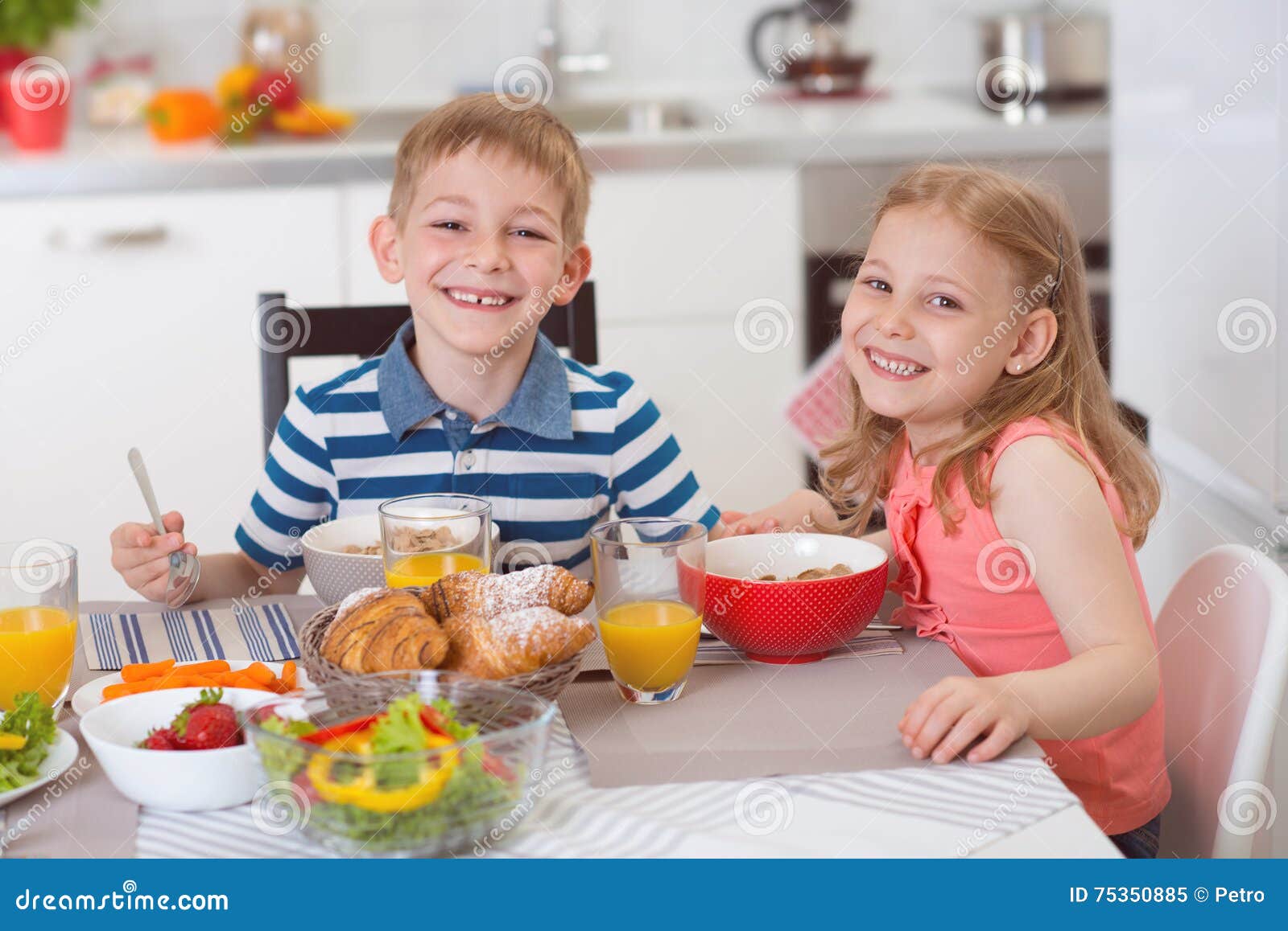 Two Happy Children Having Breakfast in Kitchen Stock Image - Image of ...