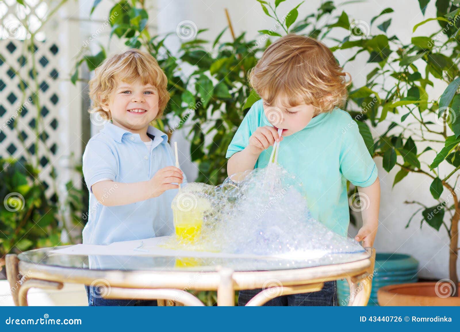 Two Happy Children Making Experiment with Colorful Bubbles Stock Photo ...