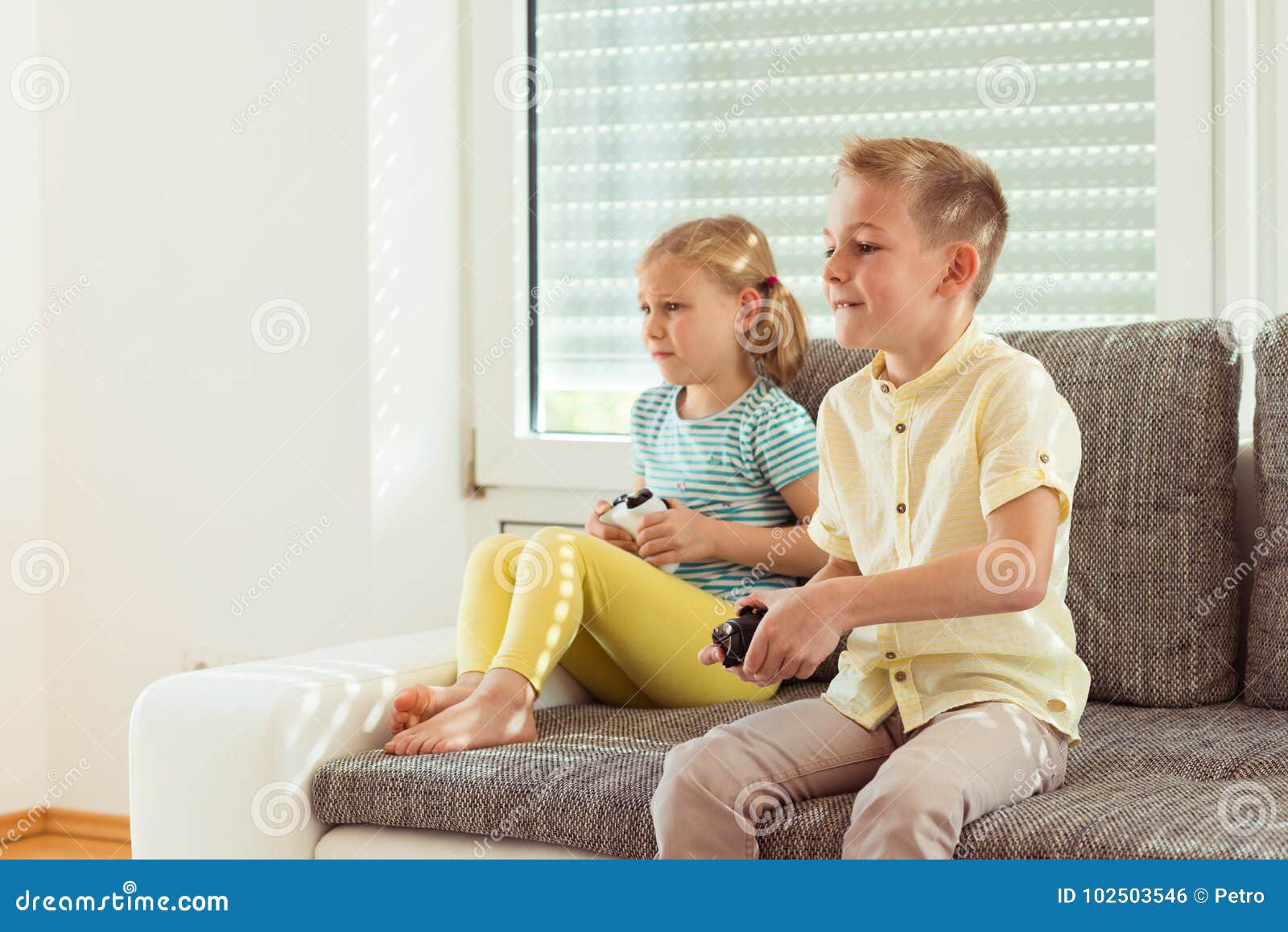 Two Happy Children Playing Video Games at Home Stock Photo - Image of ... Two Happy Children Playing Video Games at Home Stock Photo - Image of ...