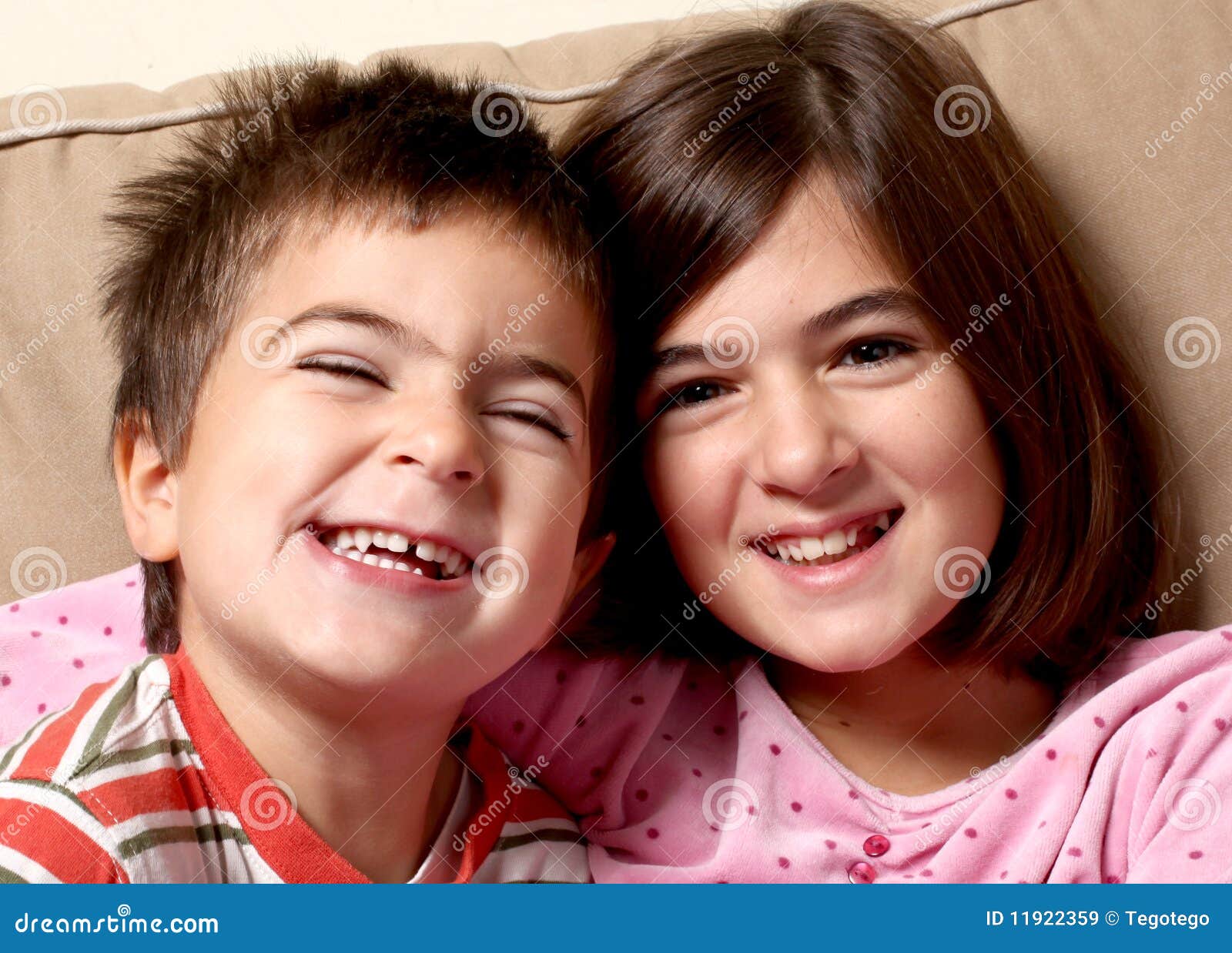 Two happy children smiling stock image. Image of group - 11922359