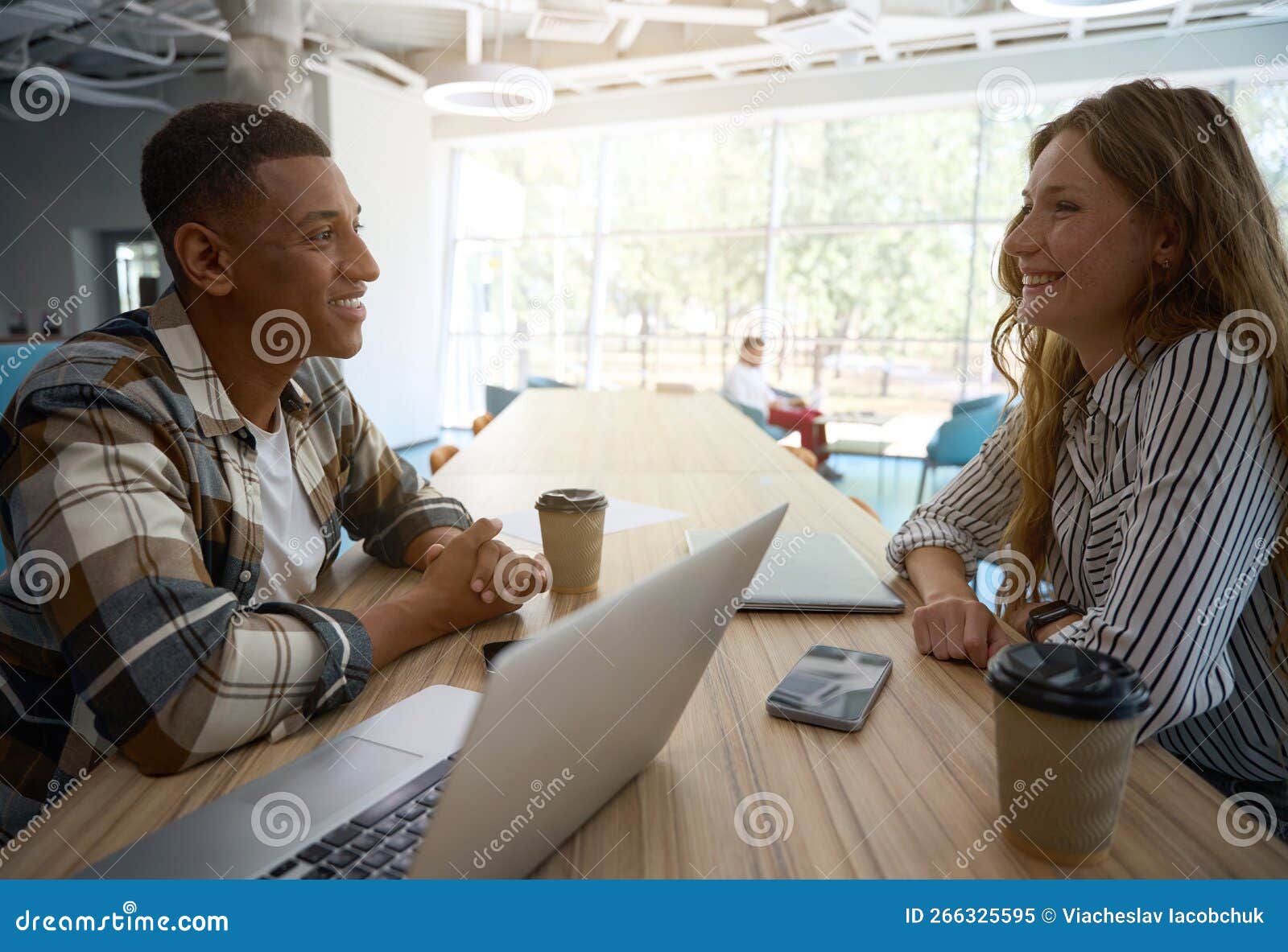 Two Happy Colleagues Talking in Office Lobby Stock Image - Image of ... Two Happy Colleagues Talking in Office Lobby Stock Image - Image of ...