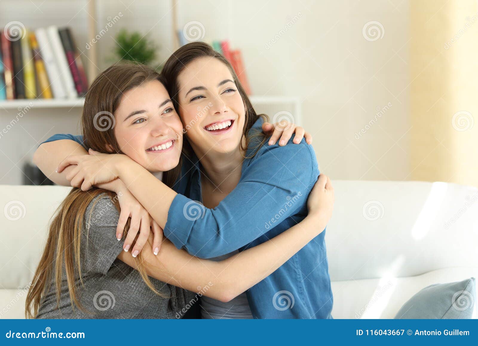 Two Happy Friends or Sisters Hugging at Home Stock Image - Image of ... Two Happy Friends or Sisters Hugging at Home Stock Image - Image of ...