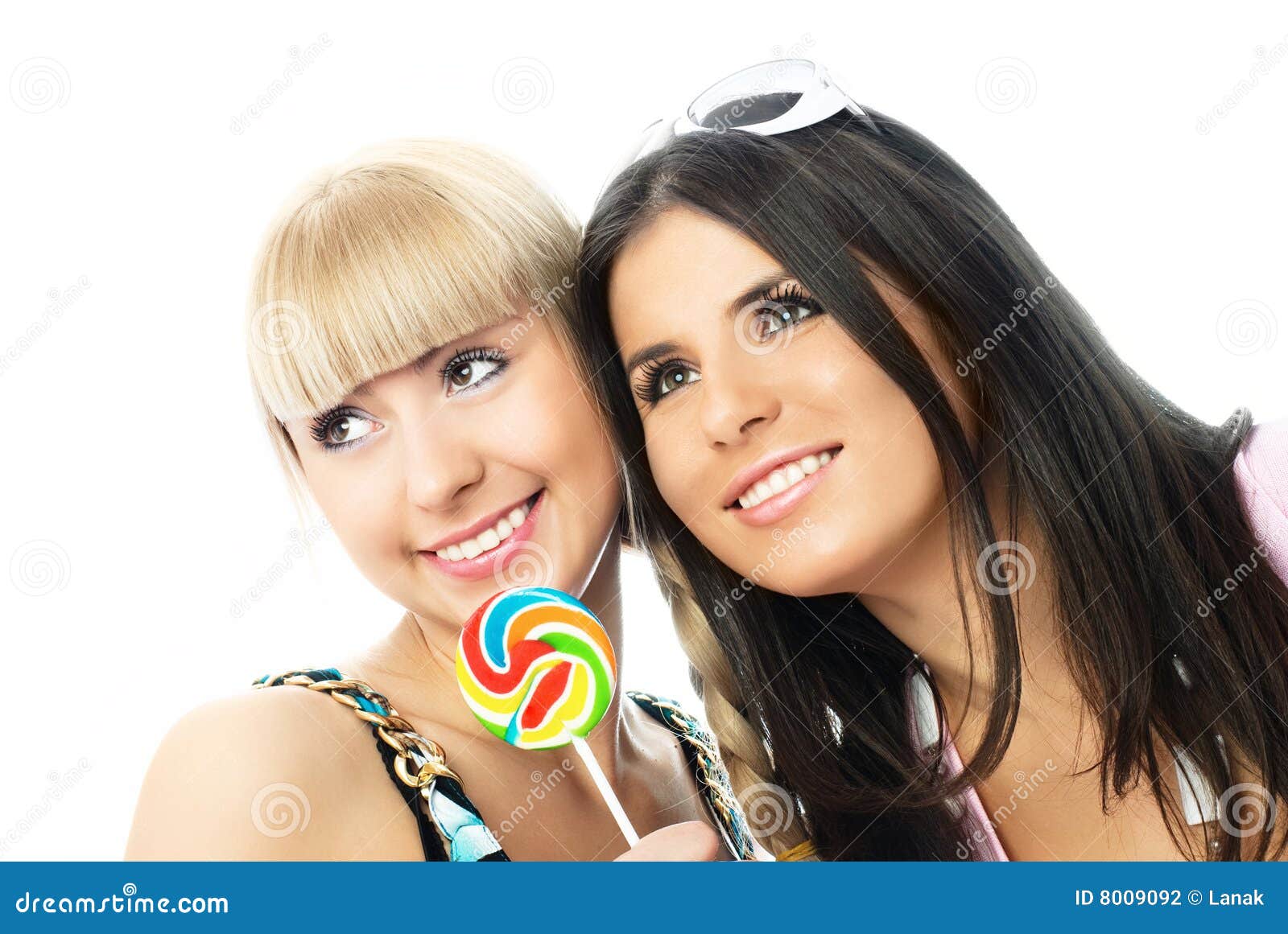 Two Happy Girls with a Candy Stock Photo - Image of dreamy, enjoy: 8009092