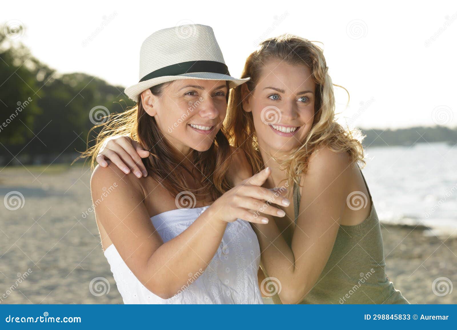Two Happy Girls Hugging at Beach Stock Image - Image of life, people ...
