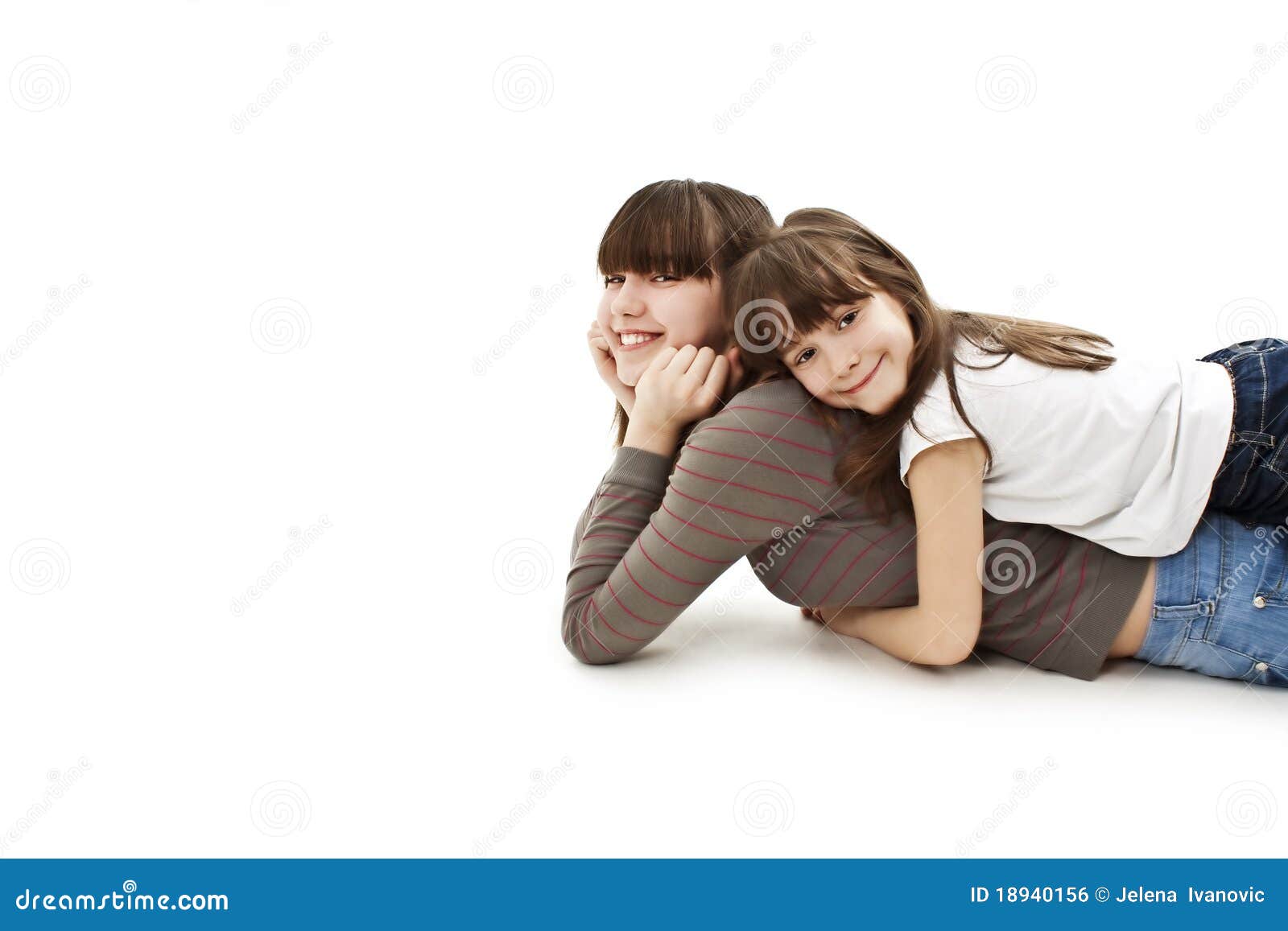 Two happy girls sisters stock photo. Image of child, adult - 18940156