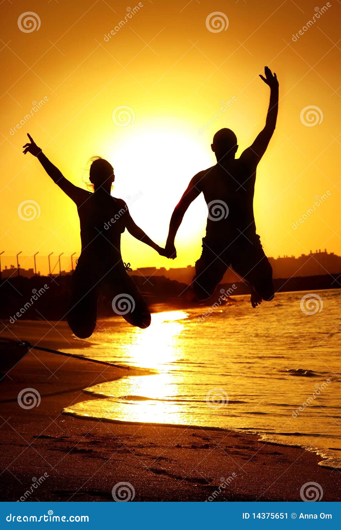 Two happy jumpers stock image. Image of freedom, jump - 14375651