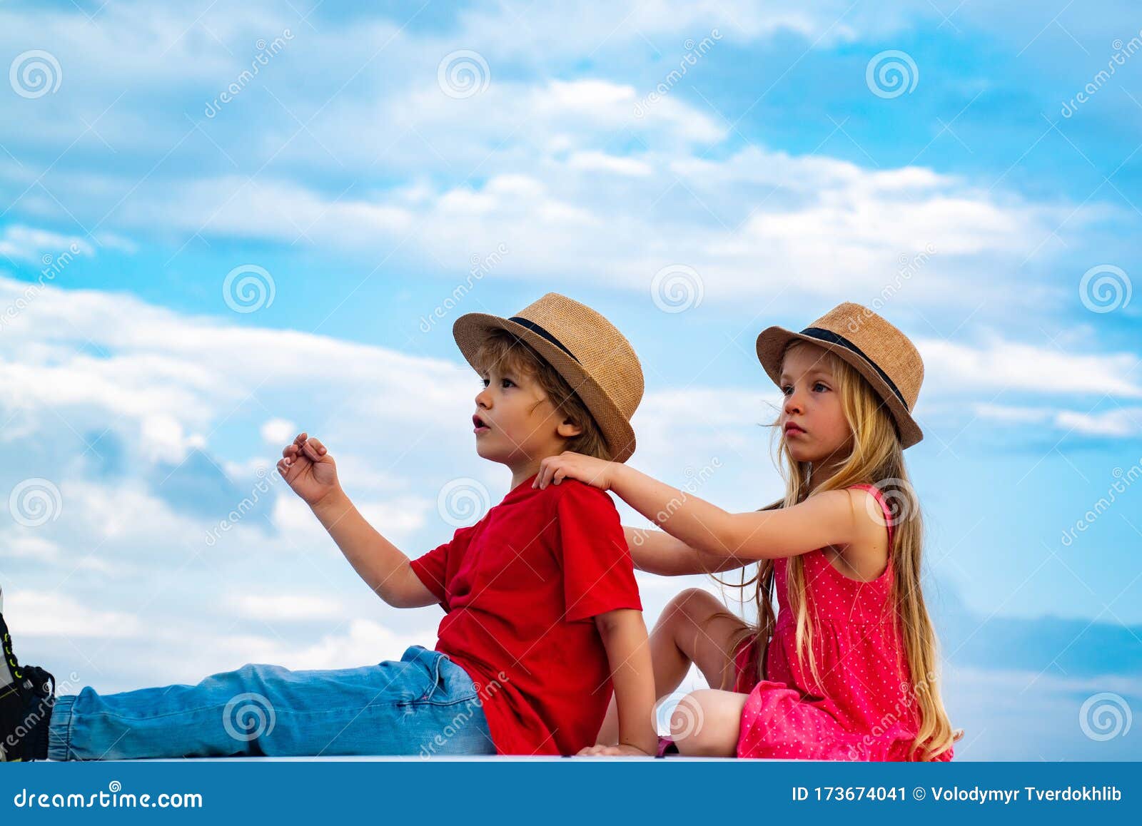 Two Happy Kids Over Blue Sky Background. Happy Kids Outdoors in Nature ...