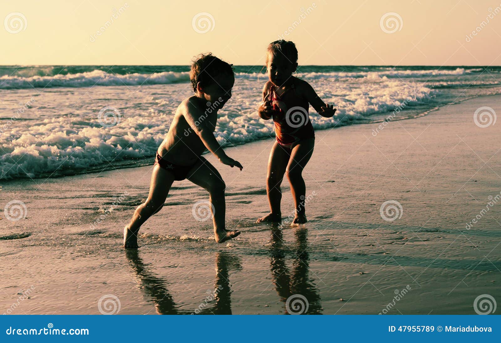Two Happy Kids Playing On The Beach Royalty-Free Stock Photo ...
