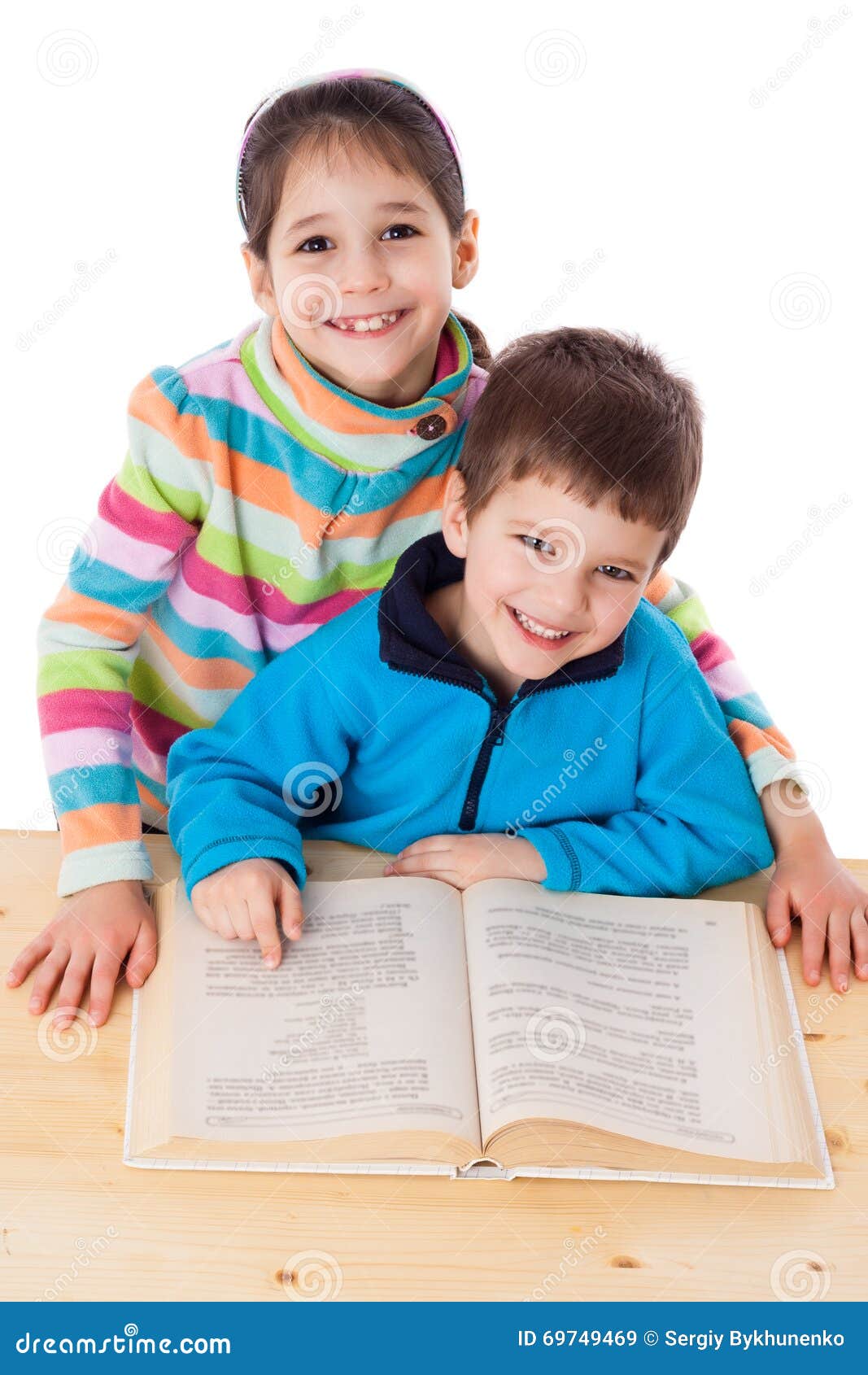 Two Happy Kids Reading the Book at the Table Stock Image - Image of ...