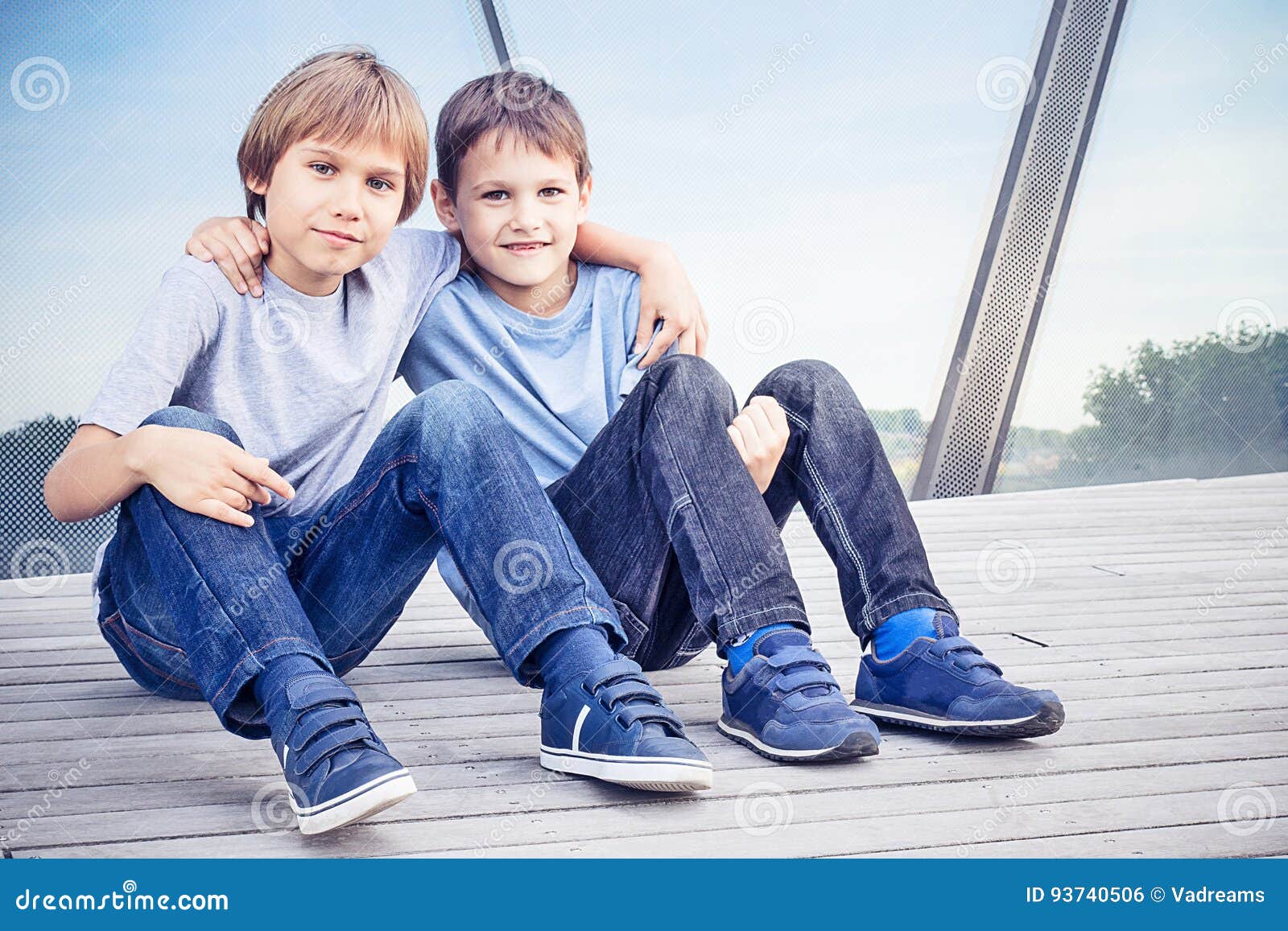 Two Happy Kids Sitting Together and Embracing Stock Photo - Image of ...