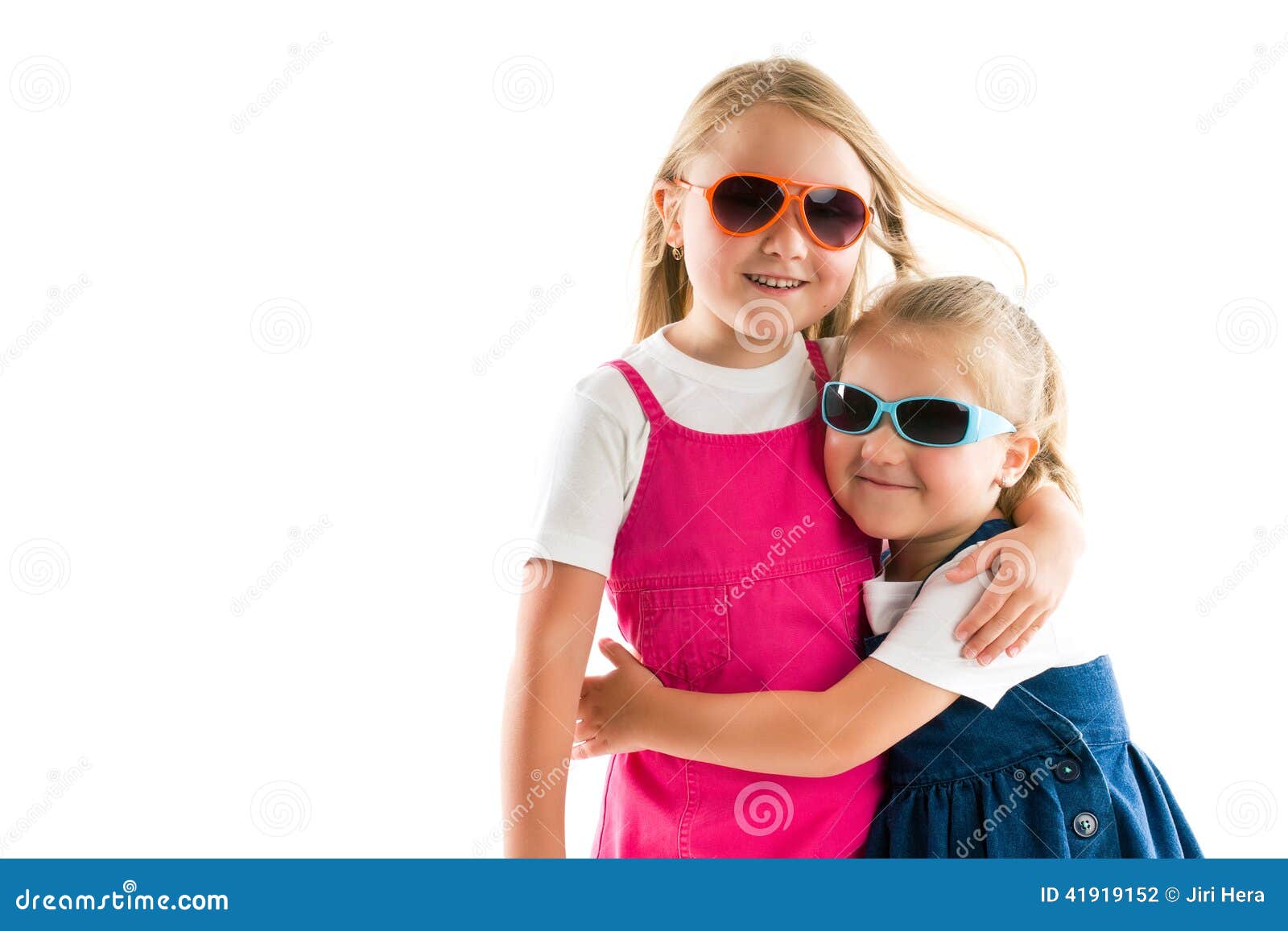 Two happy little sisters stock photo. Image of carefree - 41919152