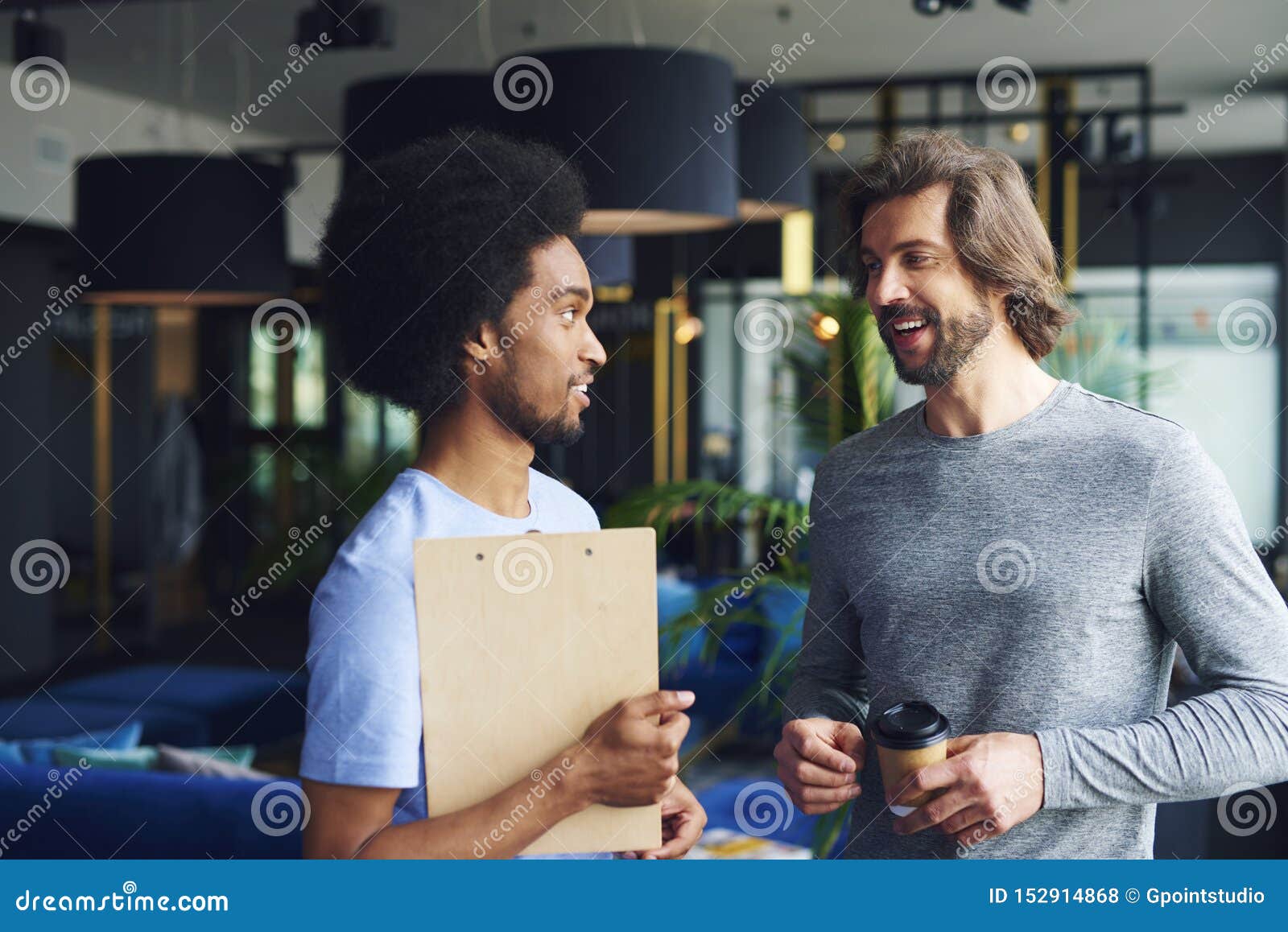 Two Happy Men Discussing at Work Stock Photo - Image of business, adult ...