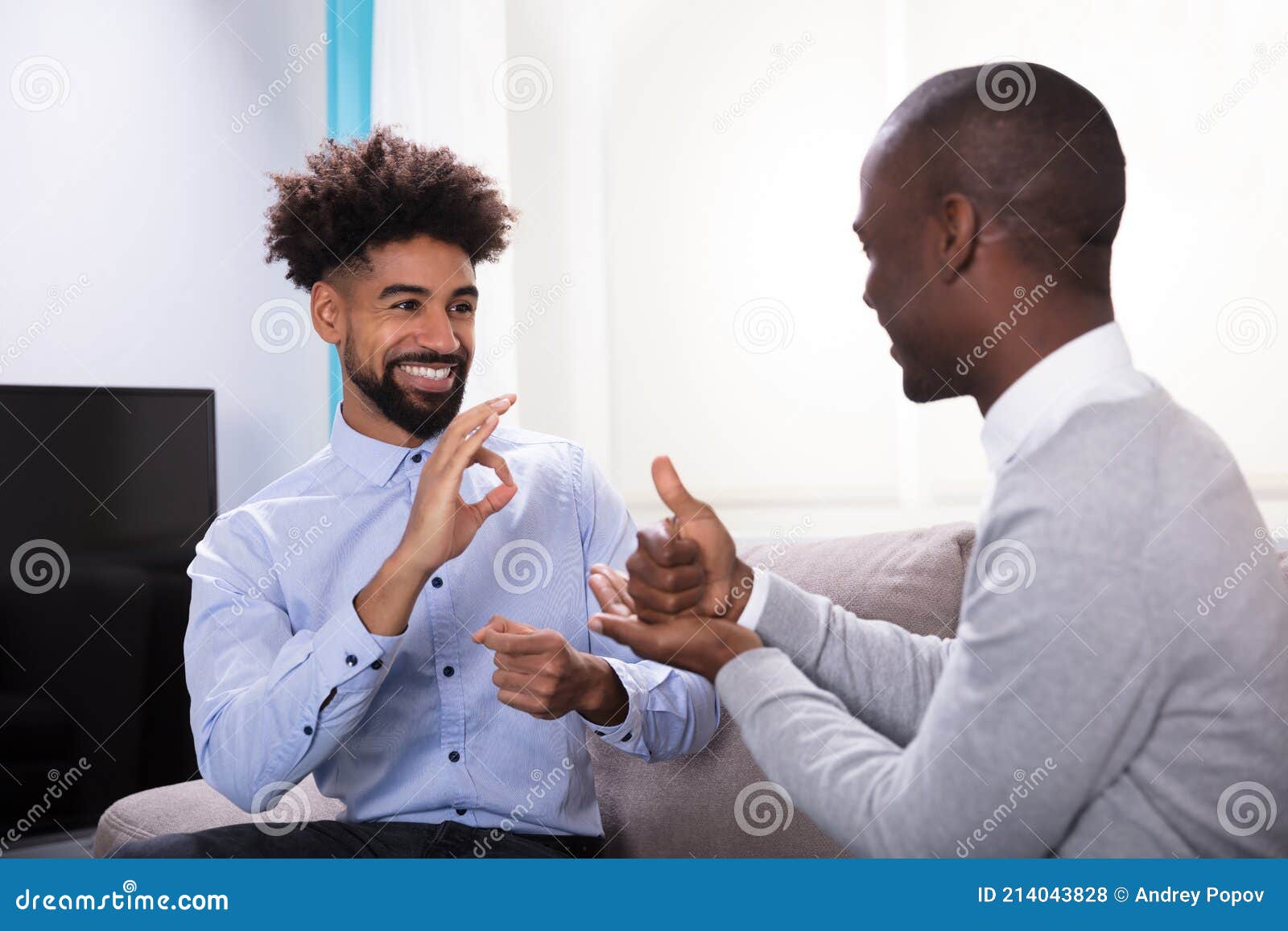Two Happy Men Making Sign Language Stock Photo - Image of apartment ...