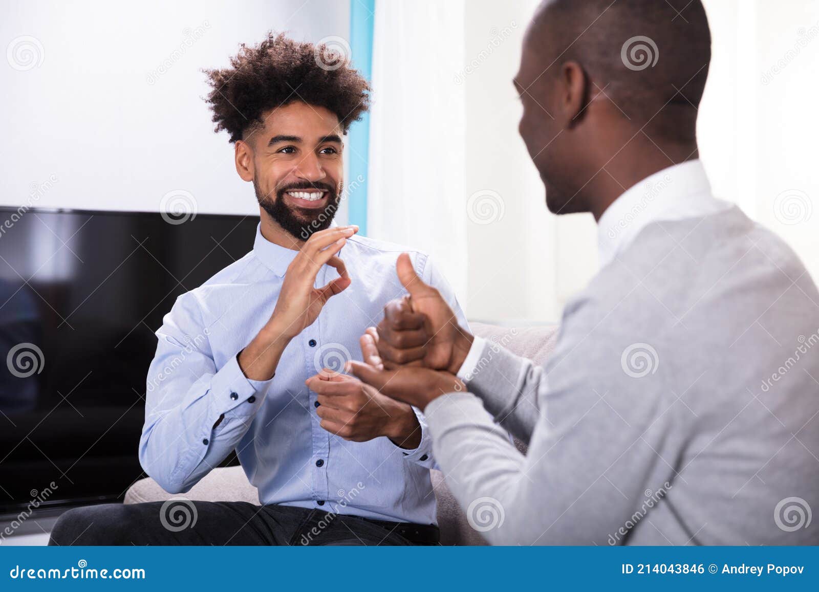 Two Happy Men Making Sign Language Stock Photo - Image of black ...