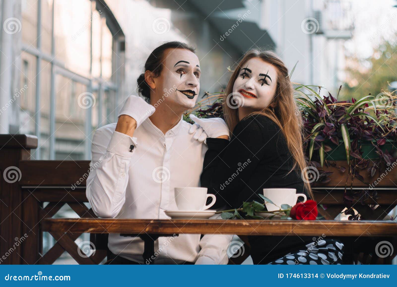 Two Happy Mime on a Date Drink Coffee in the Cafe. Romantic Date Stock ...