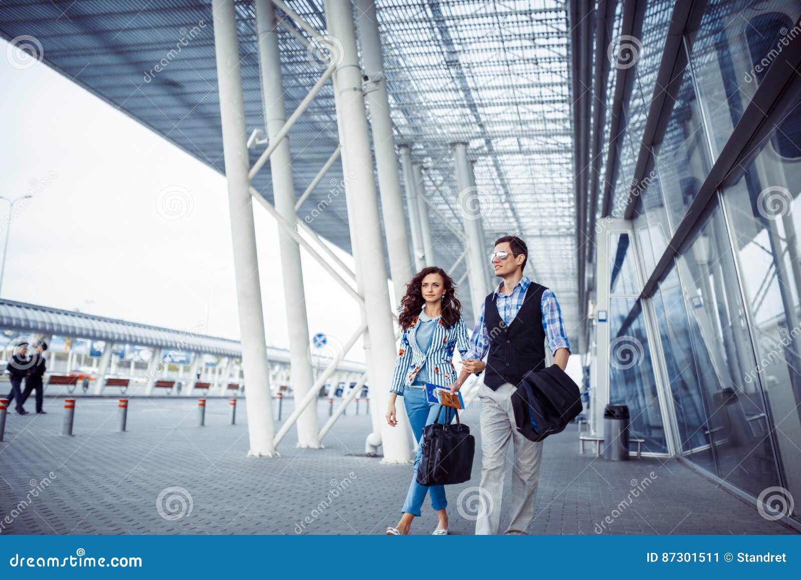 Two Happy People at the Airport Stock Image - Image of activity, adults ...