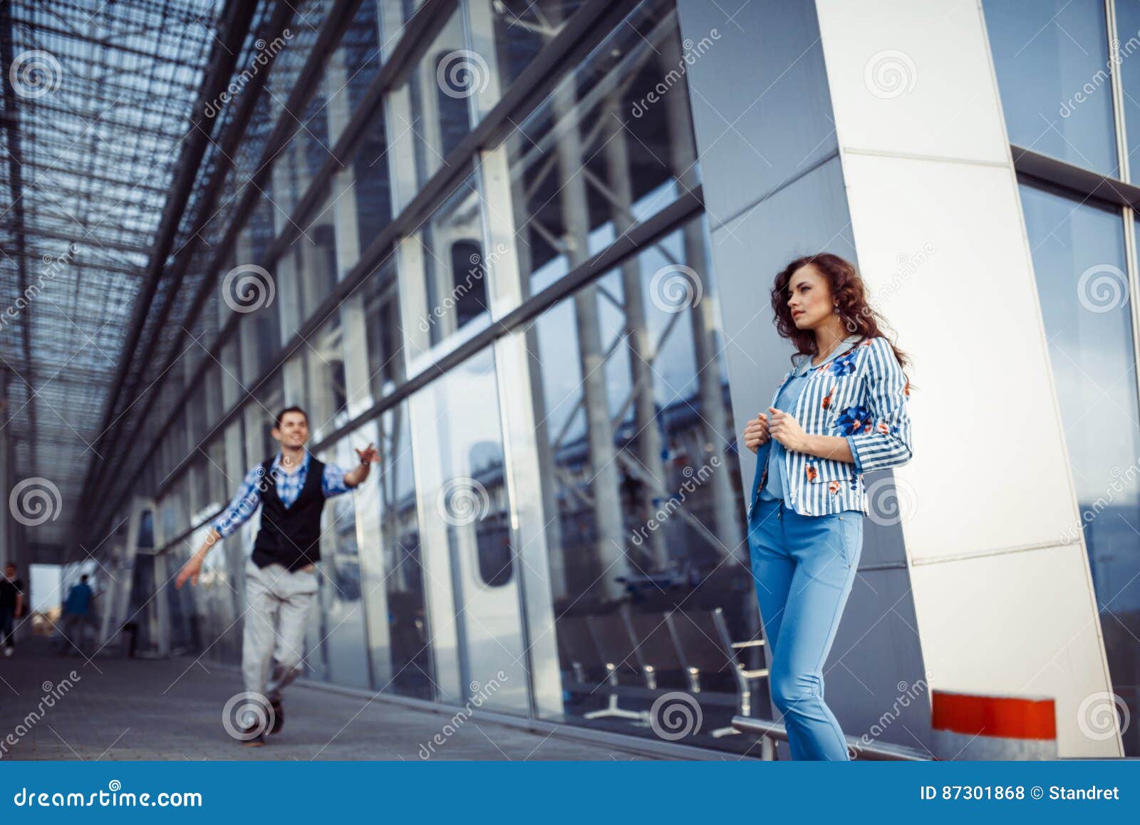 Two Happy People at the Airport Stock Photo - Image of happy, lifestyle ...