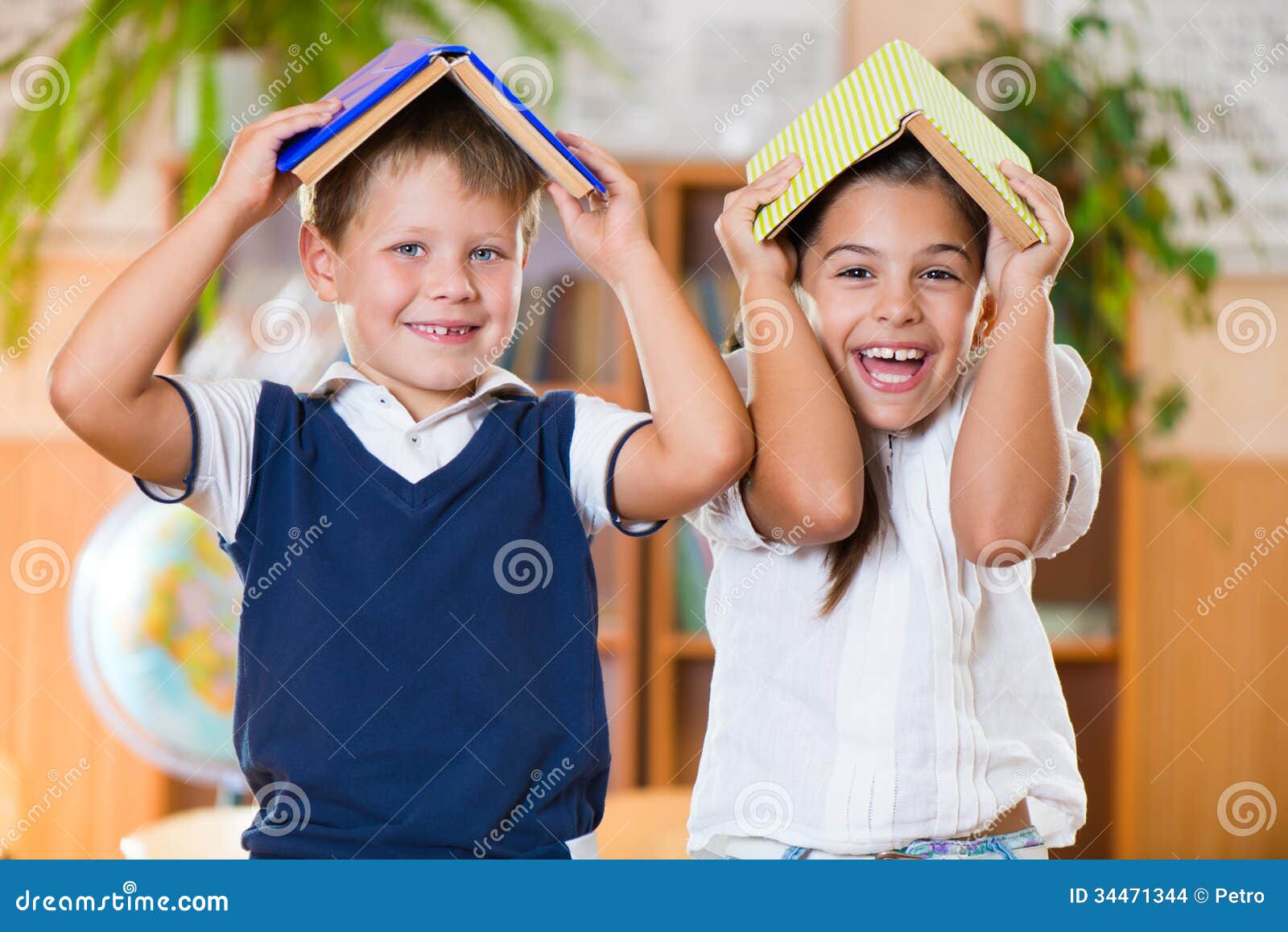Two Happy Schoolchildren Have Fun in Classroom Stock Photo - Image of ...