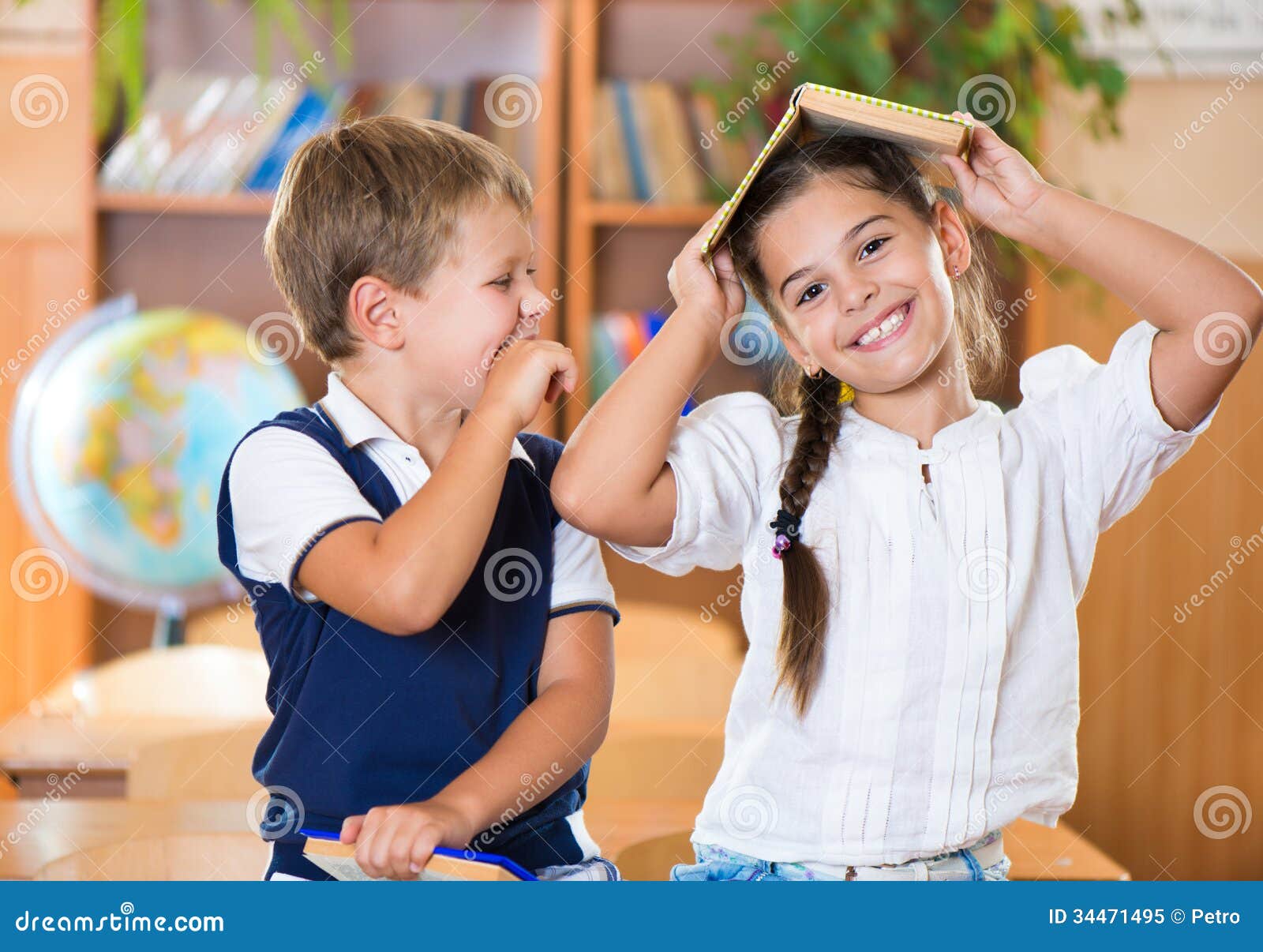 Two Happy Schoolchildren Have Fun in Classroom Stock Image - Image of ...