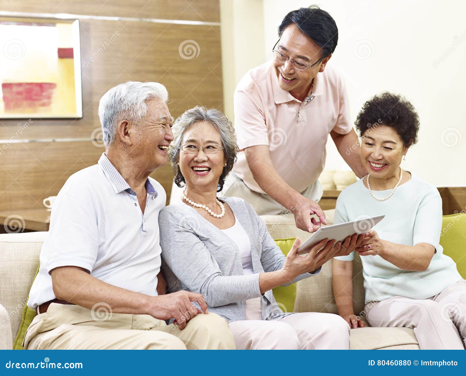 Asian Couples Exercise Indoors Together By Following A Trainer Taught ...