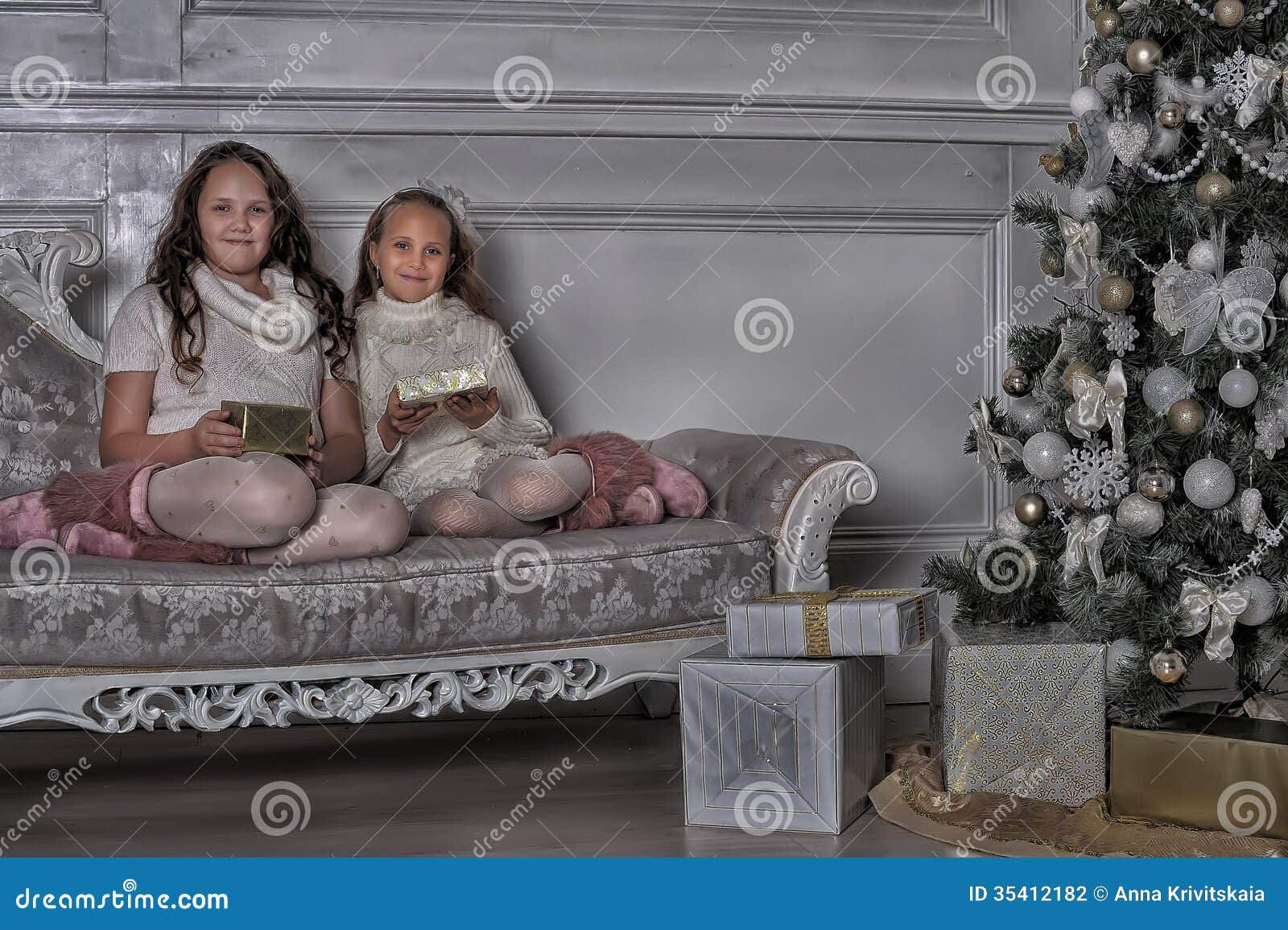 Two Happy Sisters at Christmas Stock Photo - Image of carrying, child ...