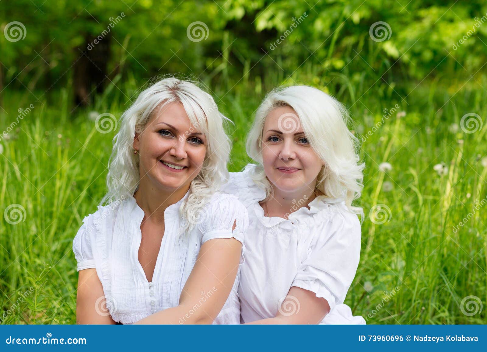 Two Happy Sisters Outdoors in Summer Stock Photo - Image of blossom ...
