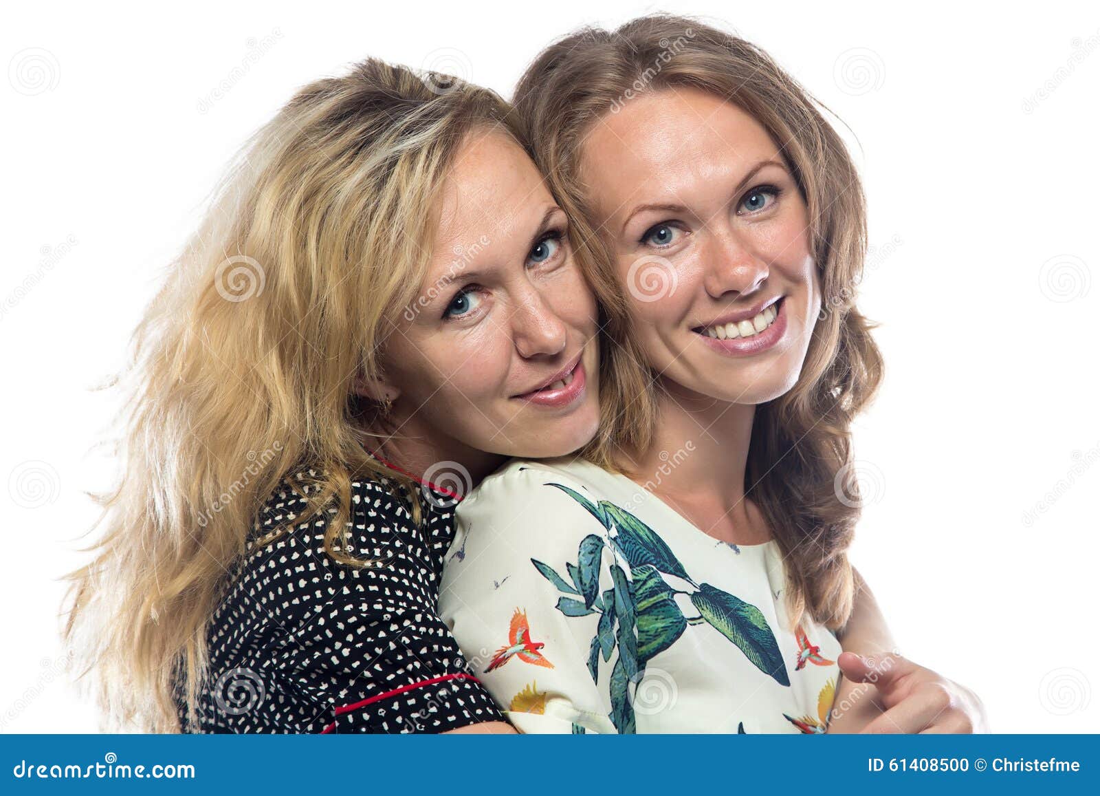 Two happy smiling sisters stock photo. Image of background - 61408500