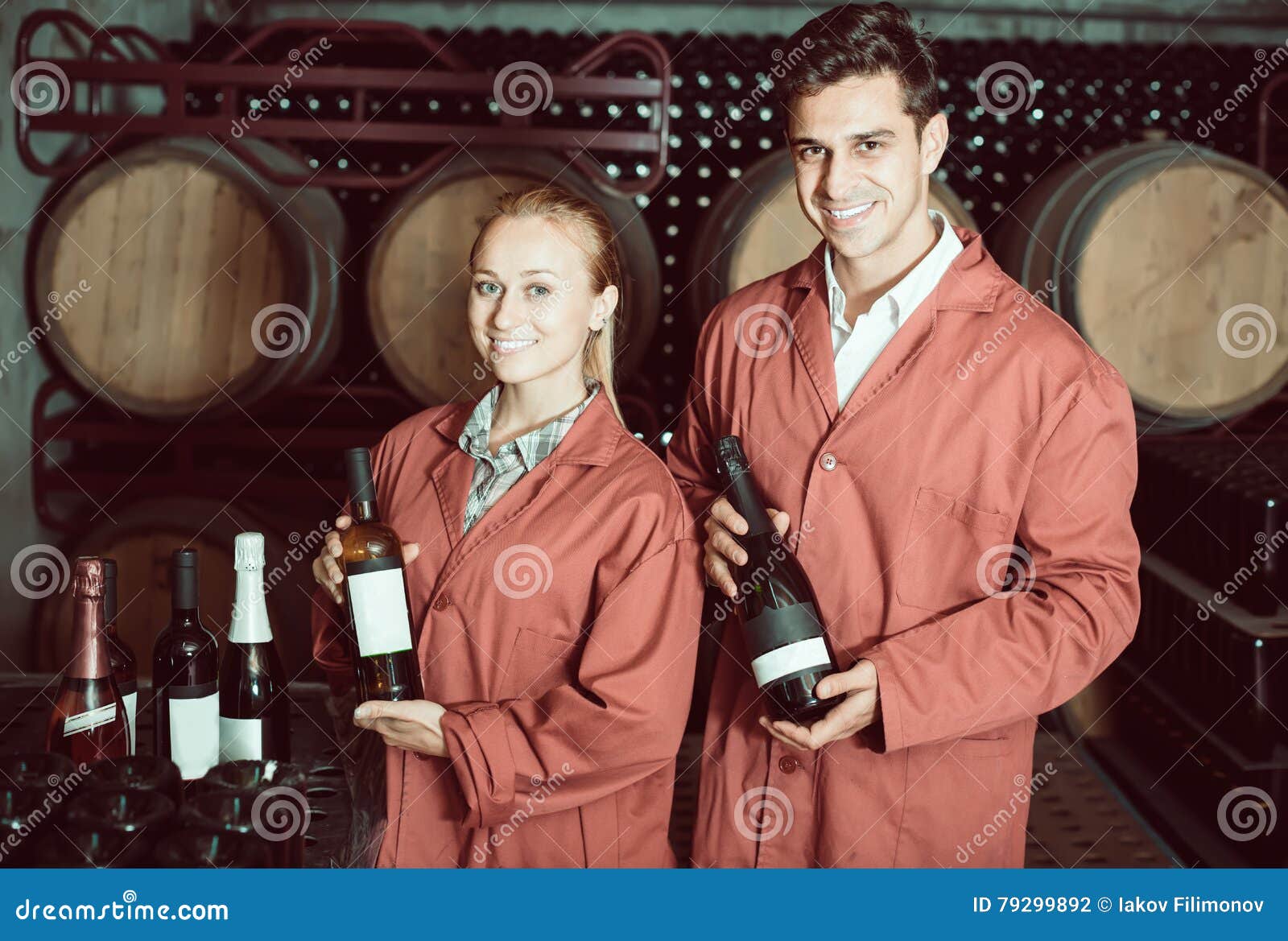 Two Happy Winery Employees in Aging Section in Cellar Stock Photo ...