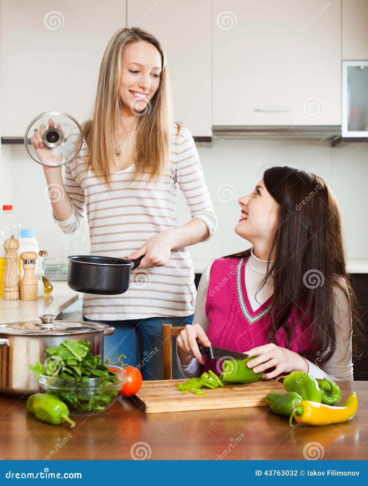 Two Happy Women Cooking Something Stock Photo - Image of pepper, knife ...