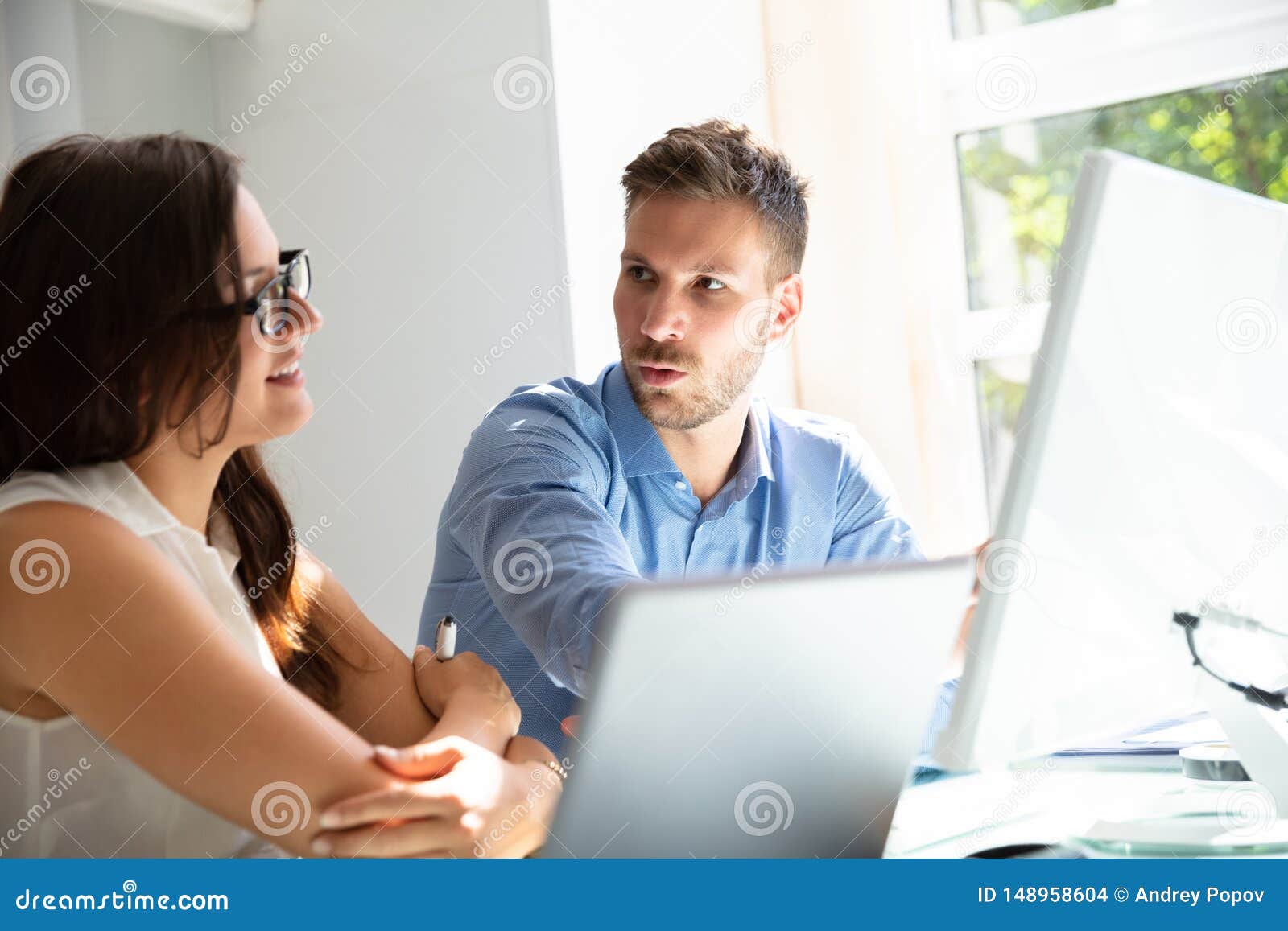 Two Businesspeople Looking at Computer Stock Photo - Image of ...