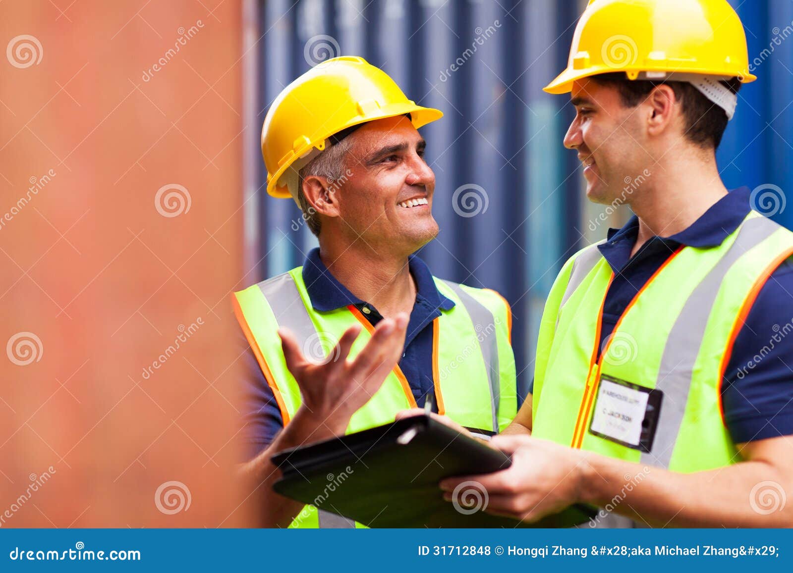 Two harbor worker stock photo. Image of industrial, reflective - 31712848